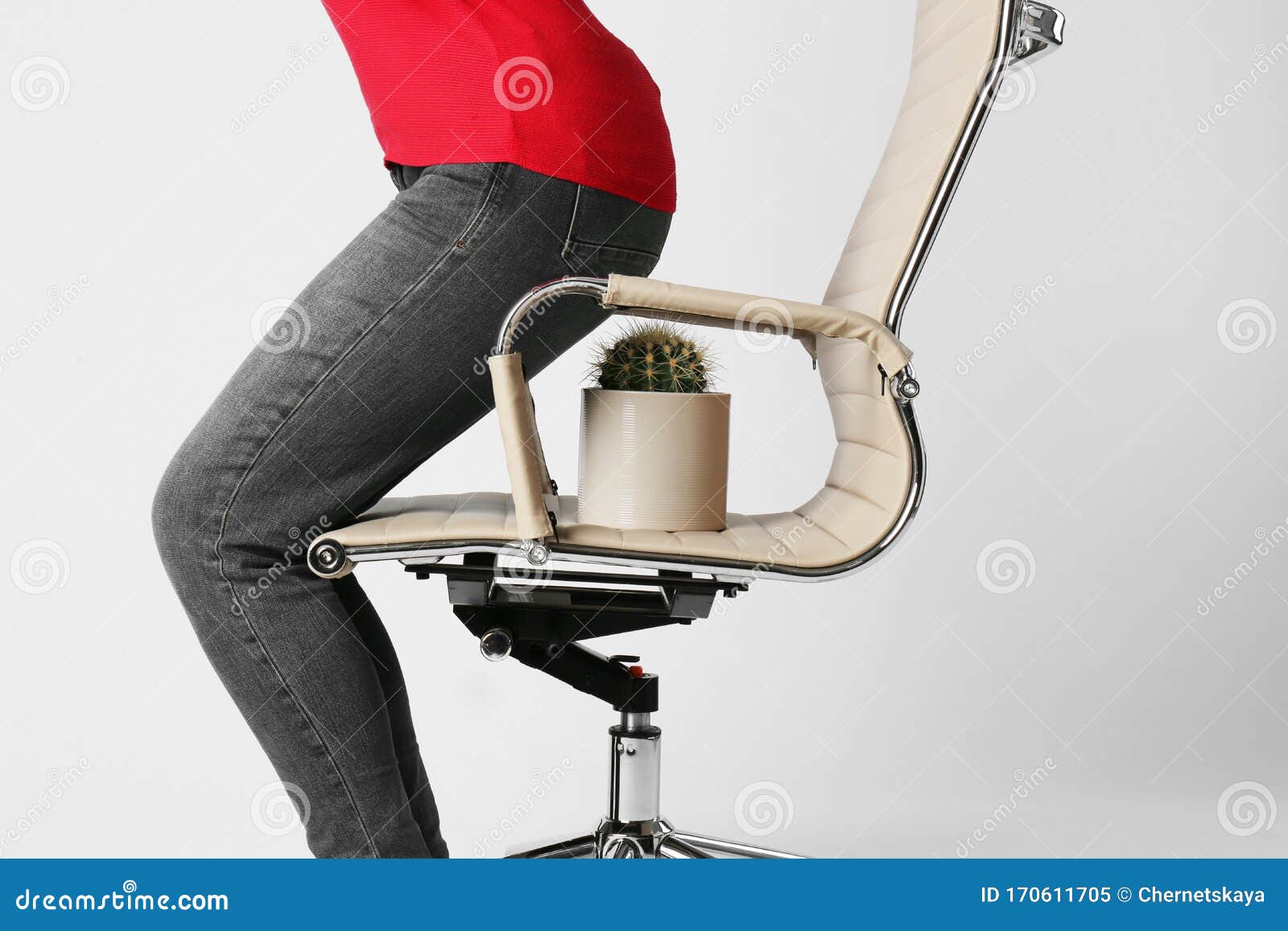 Woman Sitting Down On Chair With Cactus Against White Background
