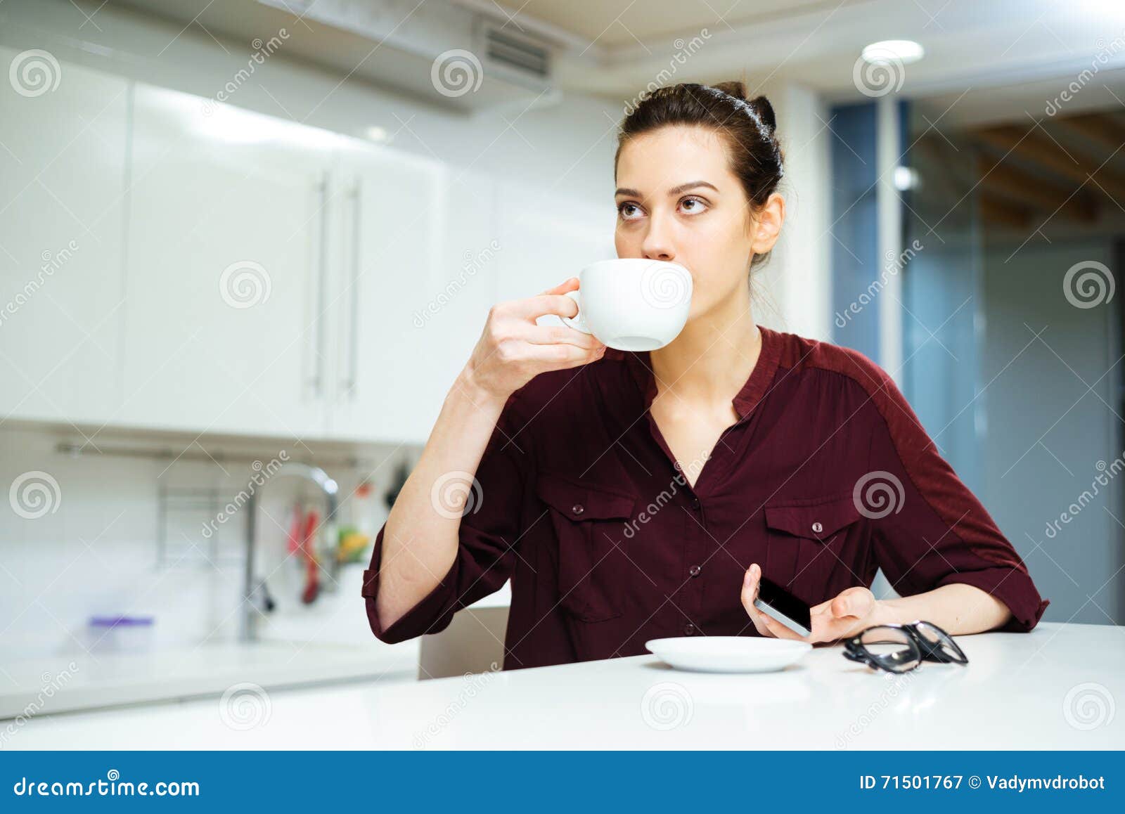Woman Sitting and Drinking Coffee on the Kitchen Stock Image - Image of ...