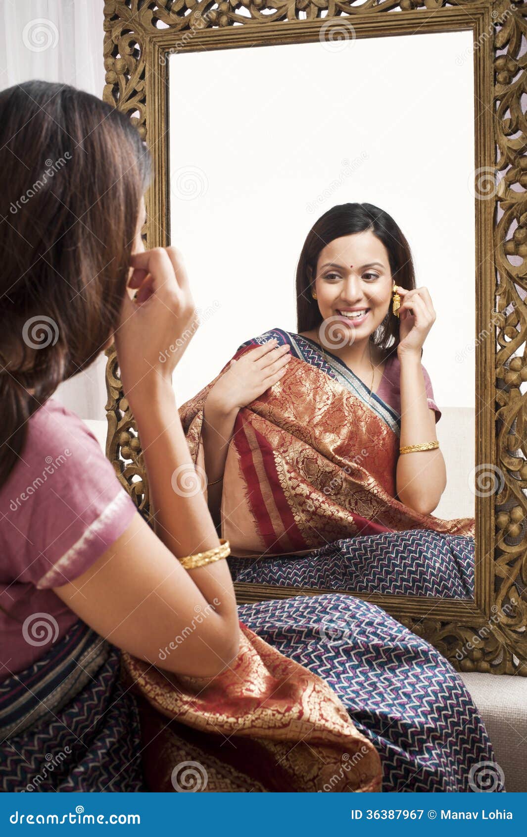 Woman Sitting in Front of Mirror Stock Image - Image of mirror, front ...