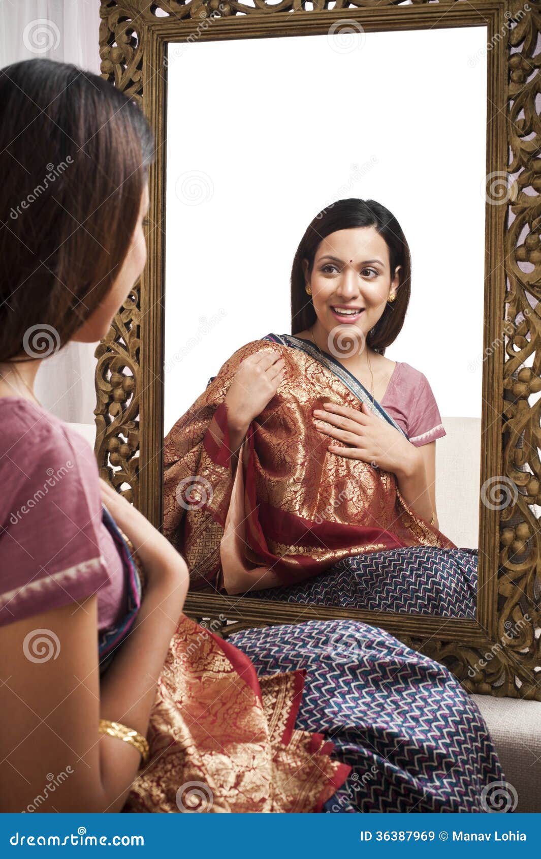 Woman Sitting in Front of Mirror Stock Image - Image of clothing ...
