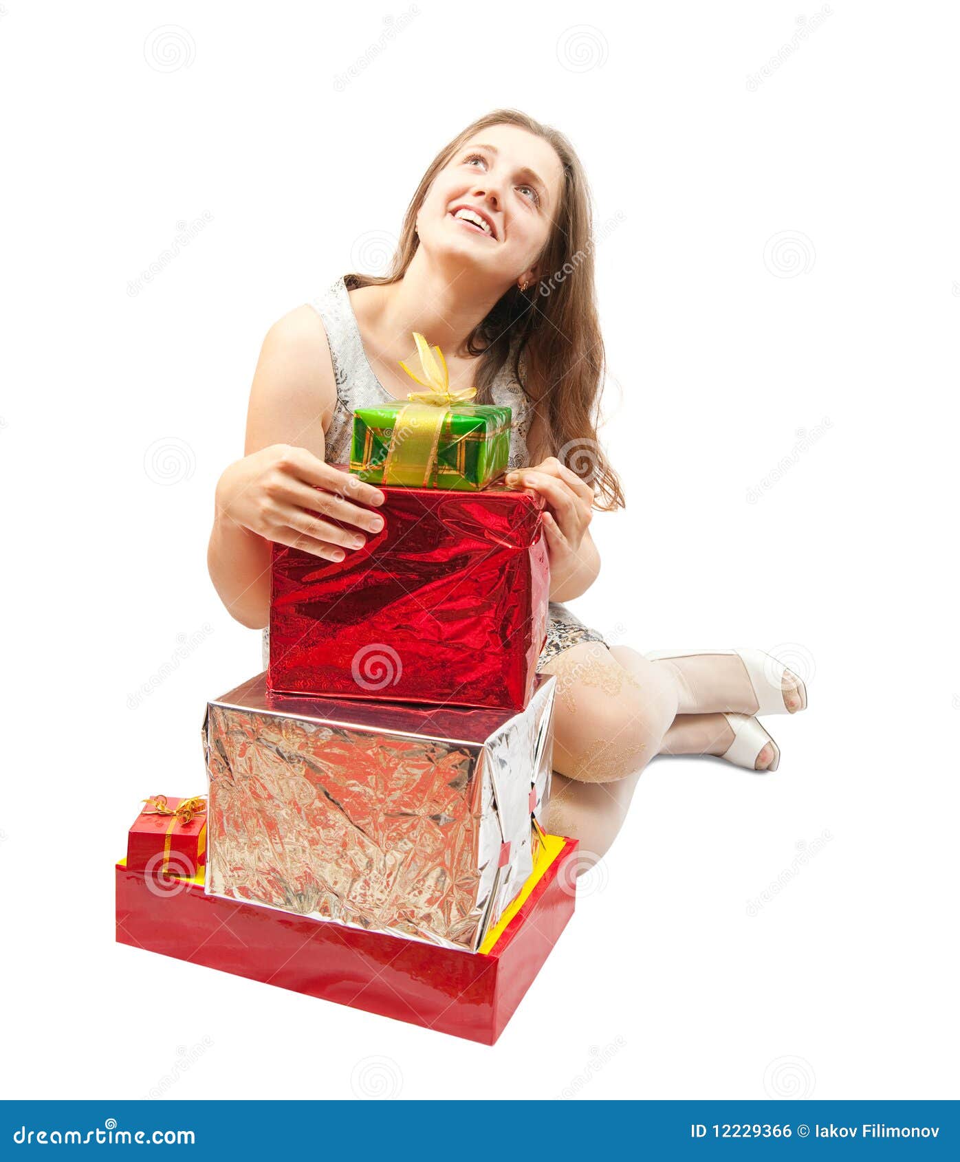 Woman sitting with gifts stock photo. Image of isolated - 12229366