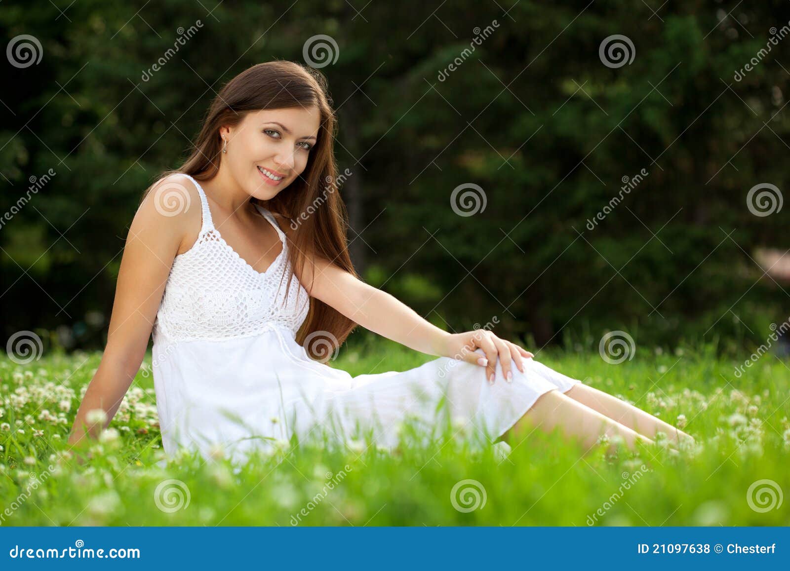 Woman sitting on grass stock photo. Image of lifestyle - 21097638