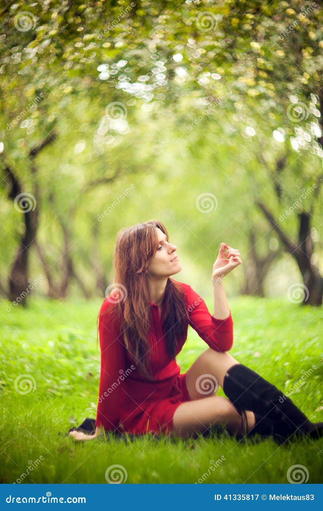Woman sitting on grass stock image. Image of caucasian - 41335817