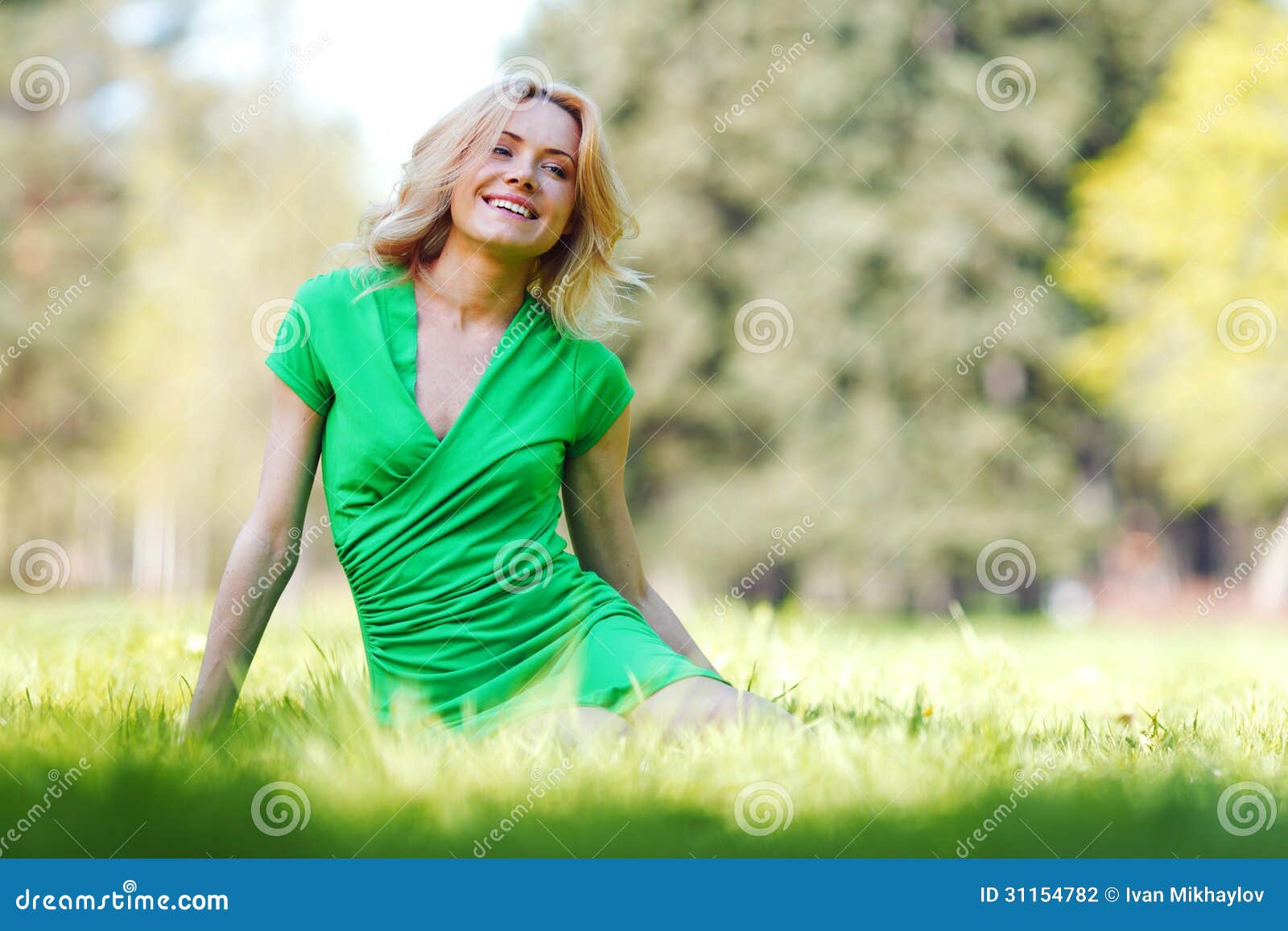 Woman sitting on grass stock photo. Image of sunny, nature - 31154782