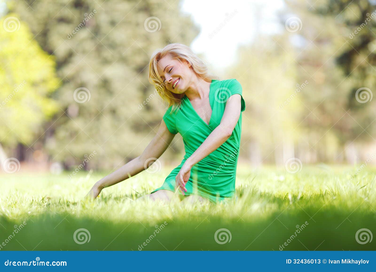 Woman sitting on grass stock image. Image of casual, happiness - 32436013