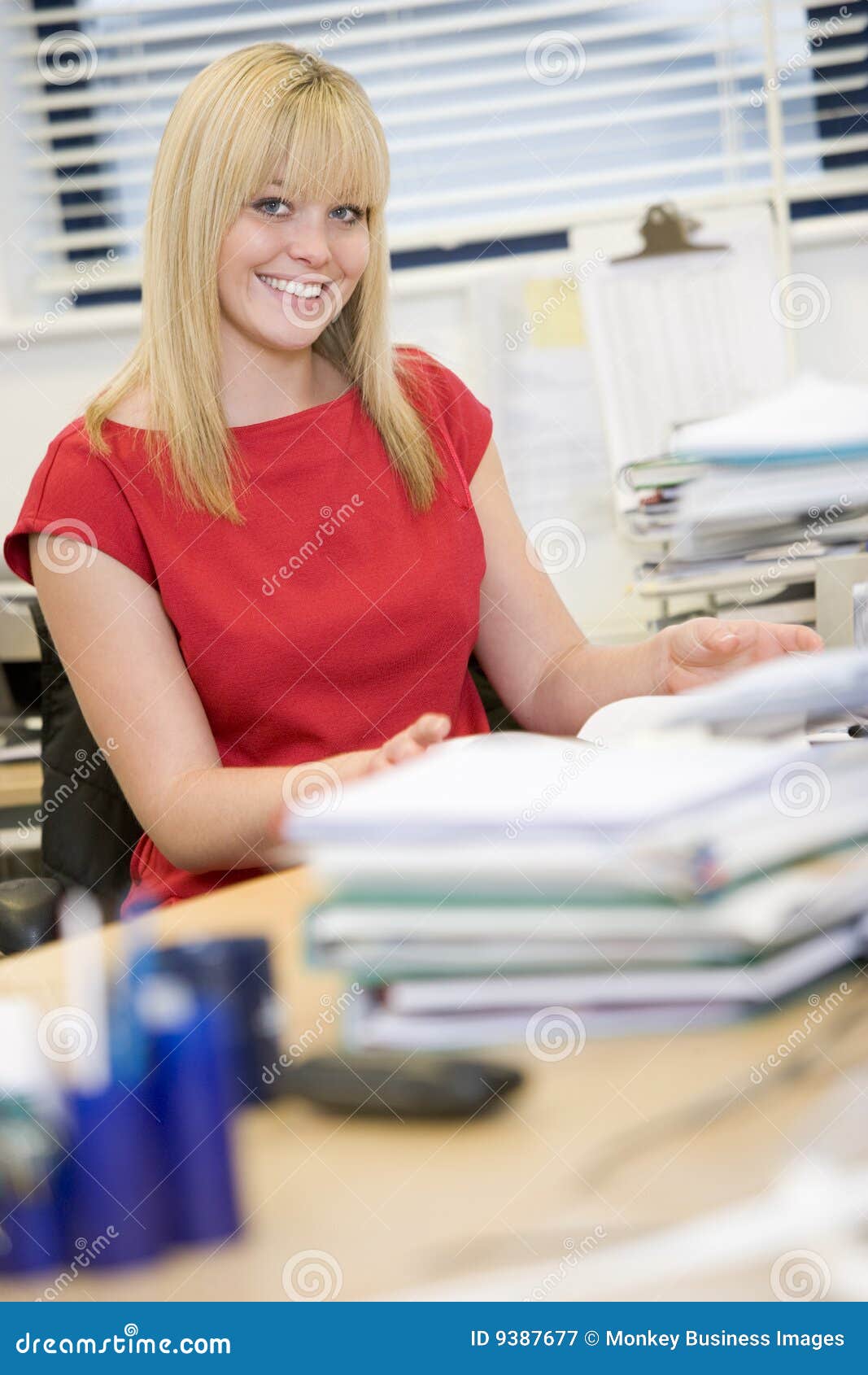 Woman Sitting Happily at Her Desk Stock Image - Image of table, indoors ...