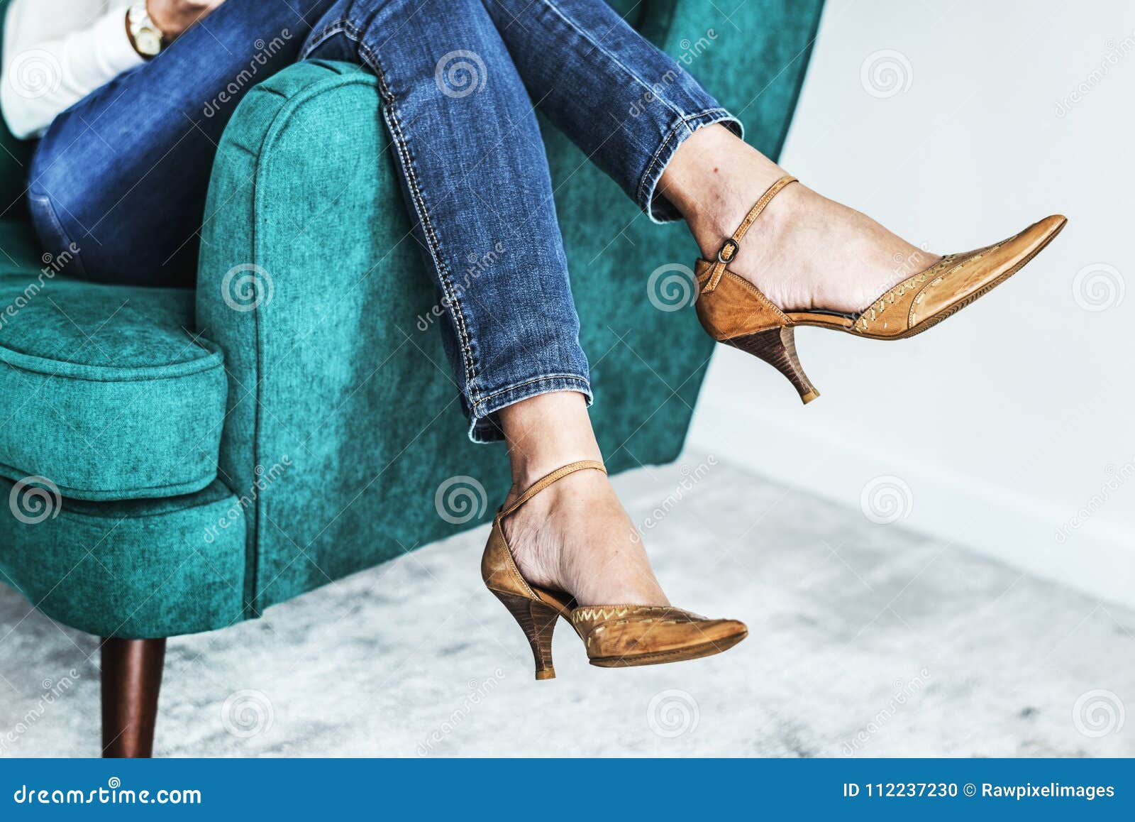 Woman Sitting with High Heels on Stock Photo - Image of happy, exchange ...