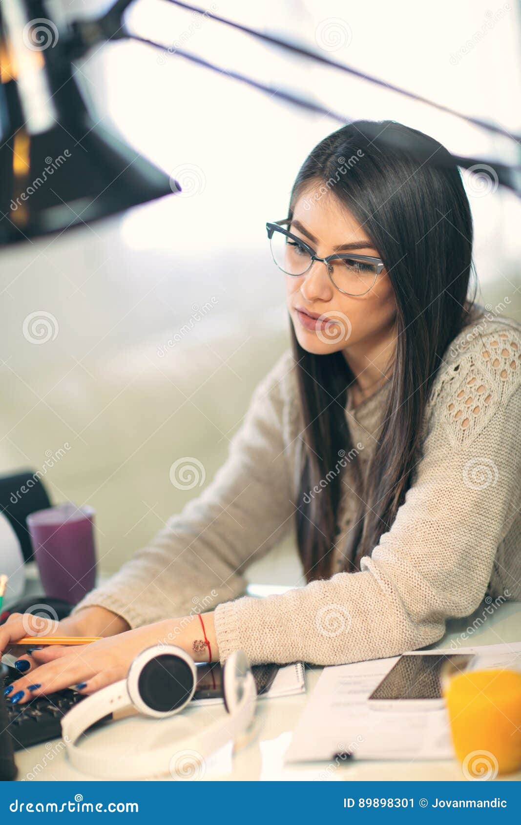 Woman Sitting in Home Office at Desk Working on Computer Stock Image ...