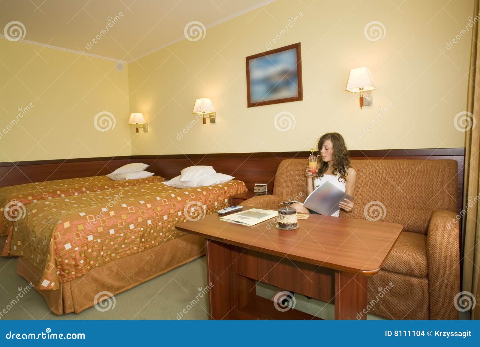 Woman Sitting in Hotel Room Stock Photo - Image of teenager, furnished ...