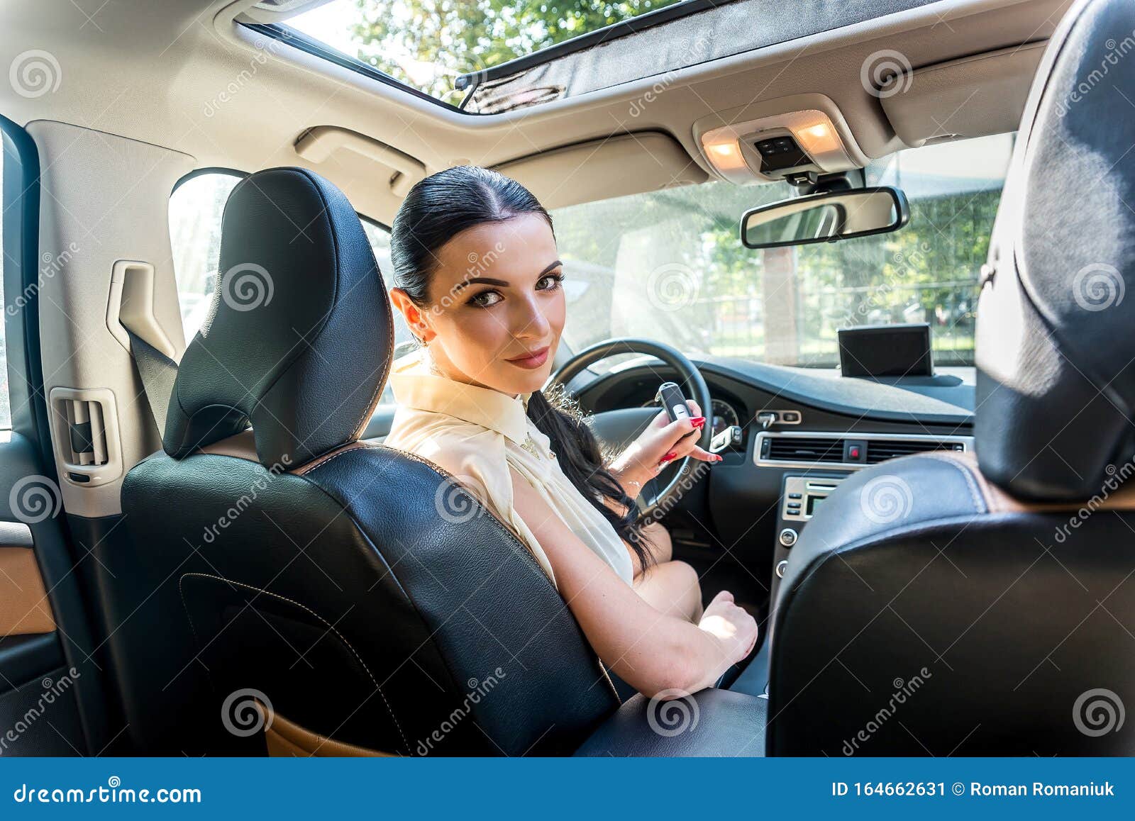 Woman Sitting Inside New Car Offering Key Stock Image - Image of ...