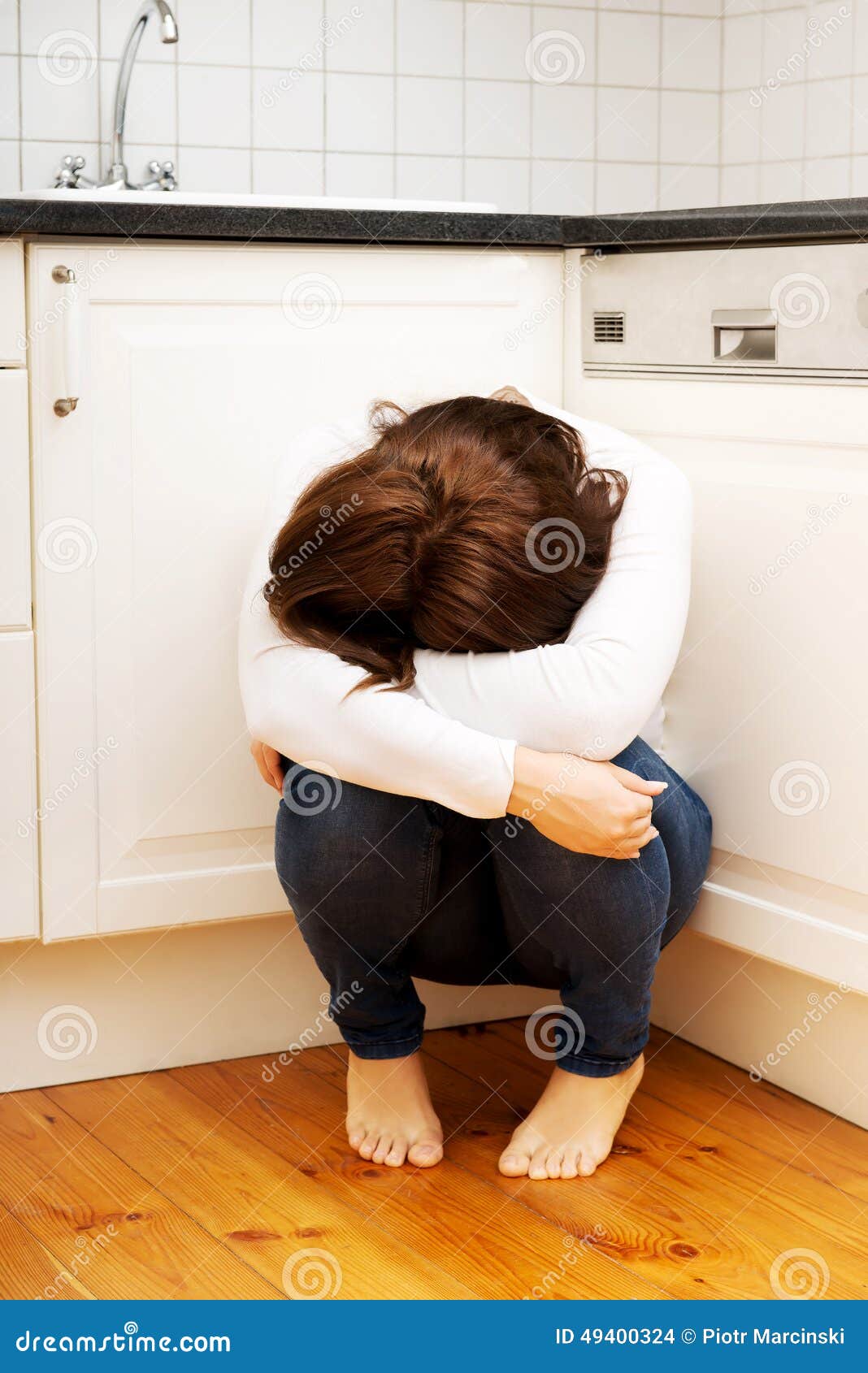 Woman Sitting on Kitchen Floor in Depression. Stock Photo - Image of ...