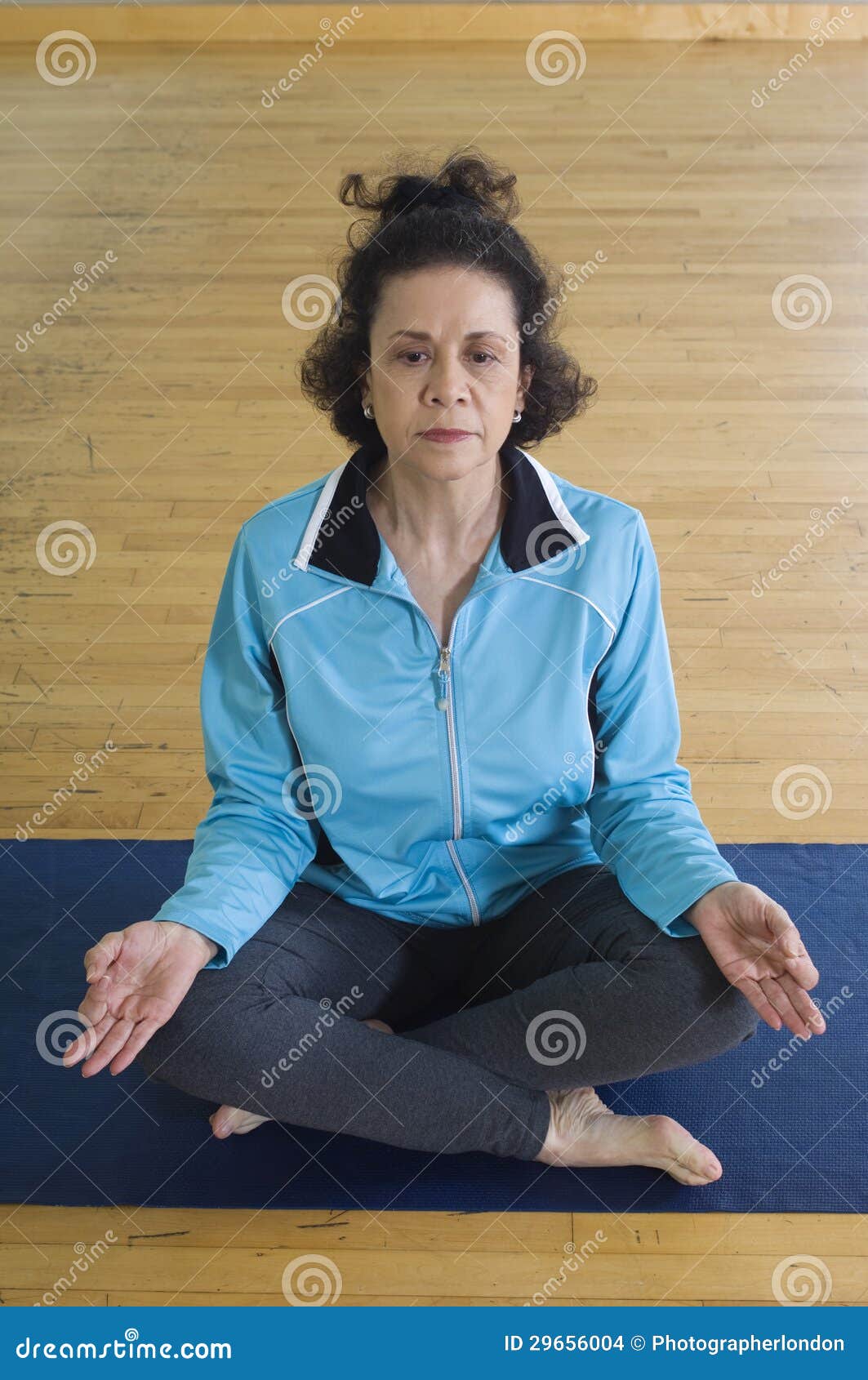 Woman Sitting in Lotus Position Stock Photo - Image of meditating ...