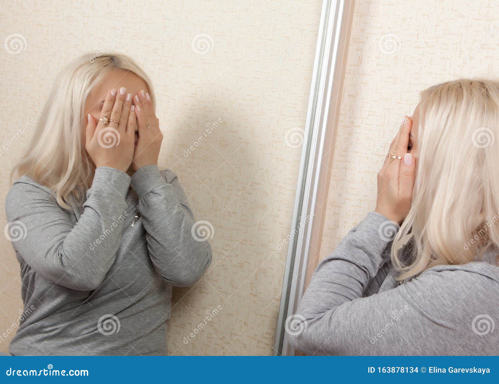 The Woman, Sitting by the Mirror Stock Photo - Image of problem, hold ...