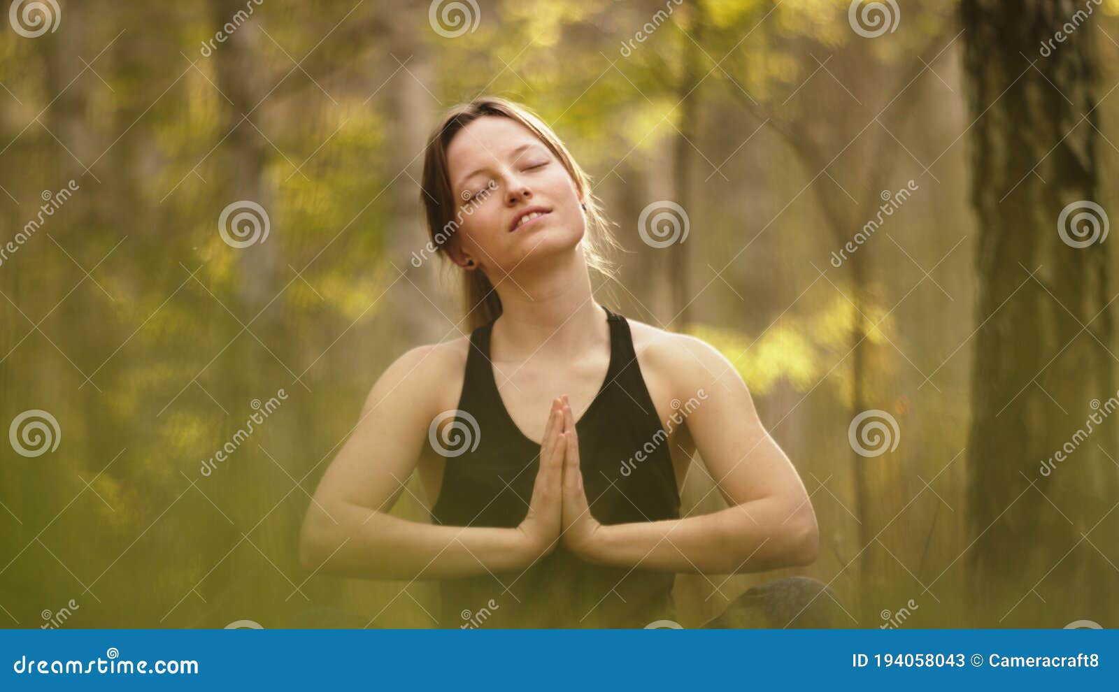 Woman Sitting Namaste Yoga Pose In Spiritual Relaxation Serenity And