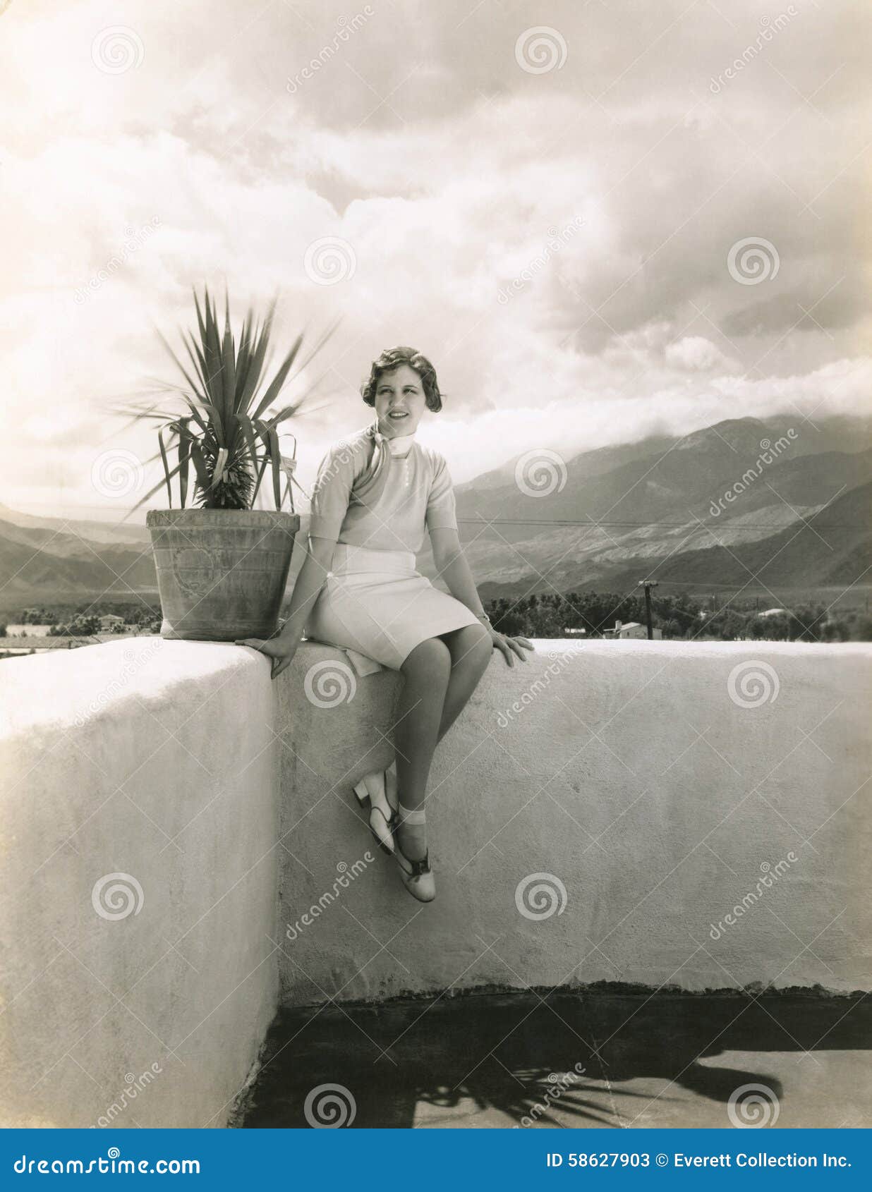 Woman Sitting on Outdoor Ledge Stock Image - Image of 19101940, life ...