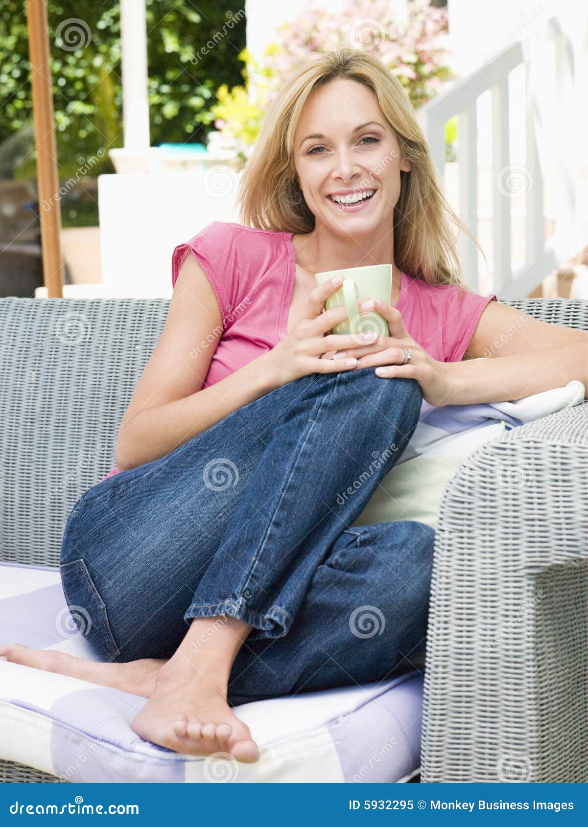 Woman Sitting Outdoors on Patio with Coffee Stock Image - Image of ...