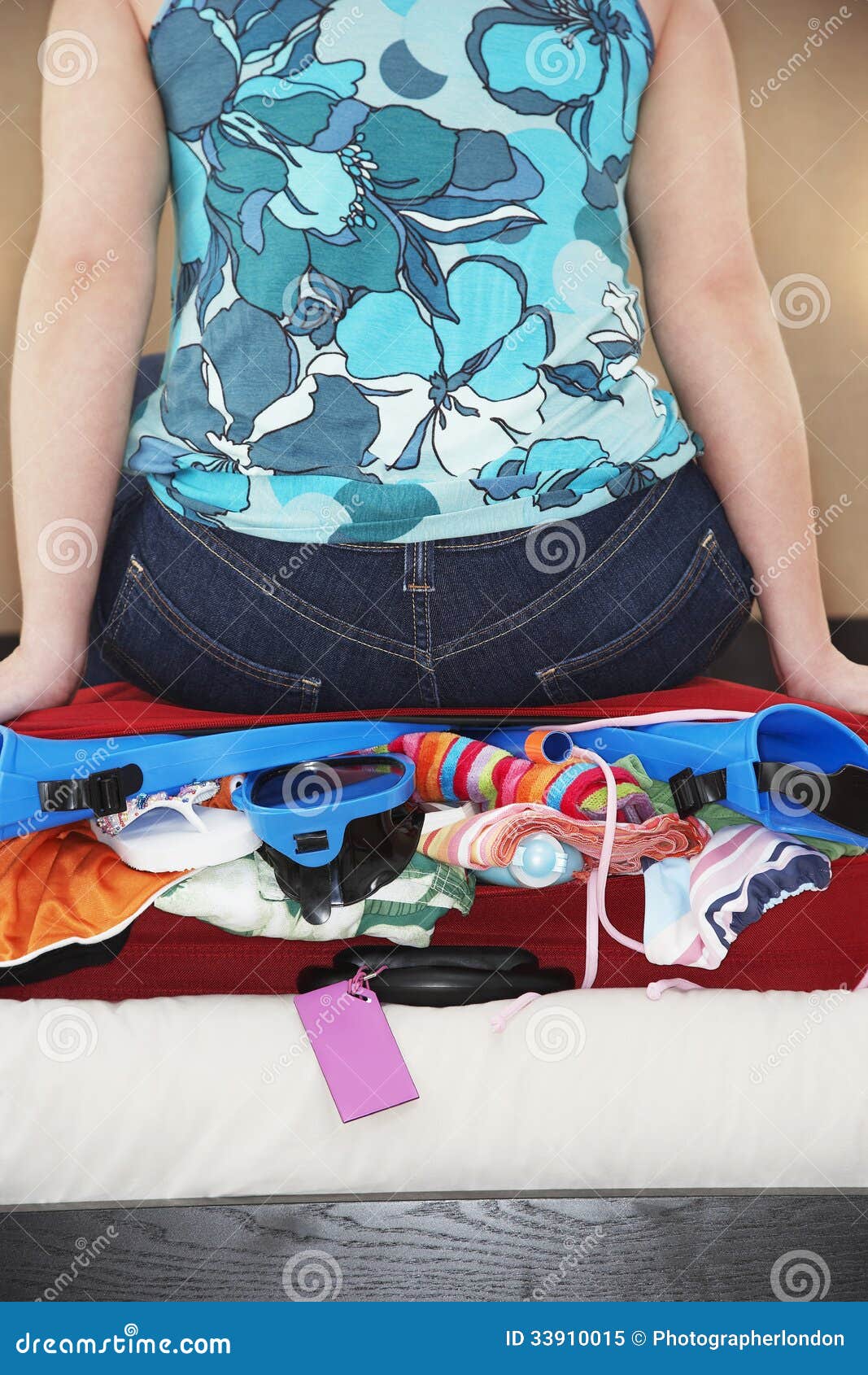 Woman Sitting on Overstuffed Suitcase Stock Image - Image of midsection ...