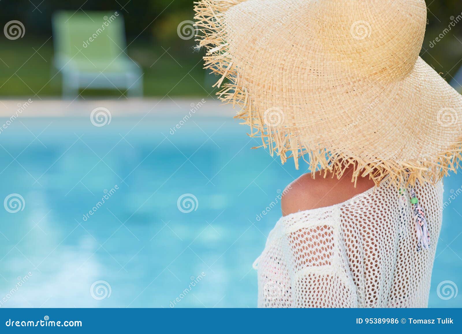 Woman Sitting by the Pool Side and Smiling Over Her S Stock Photo ...
