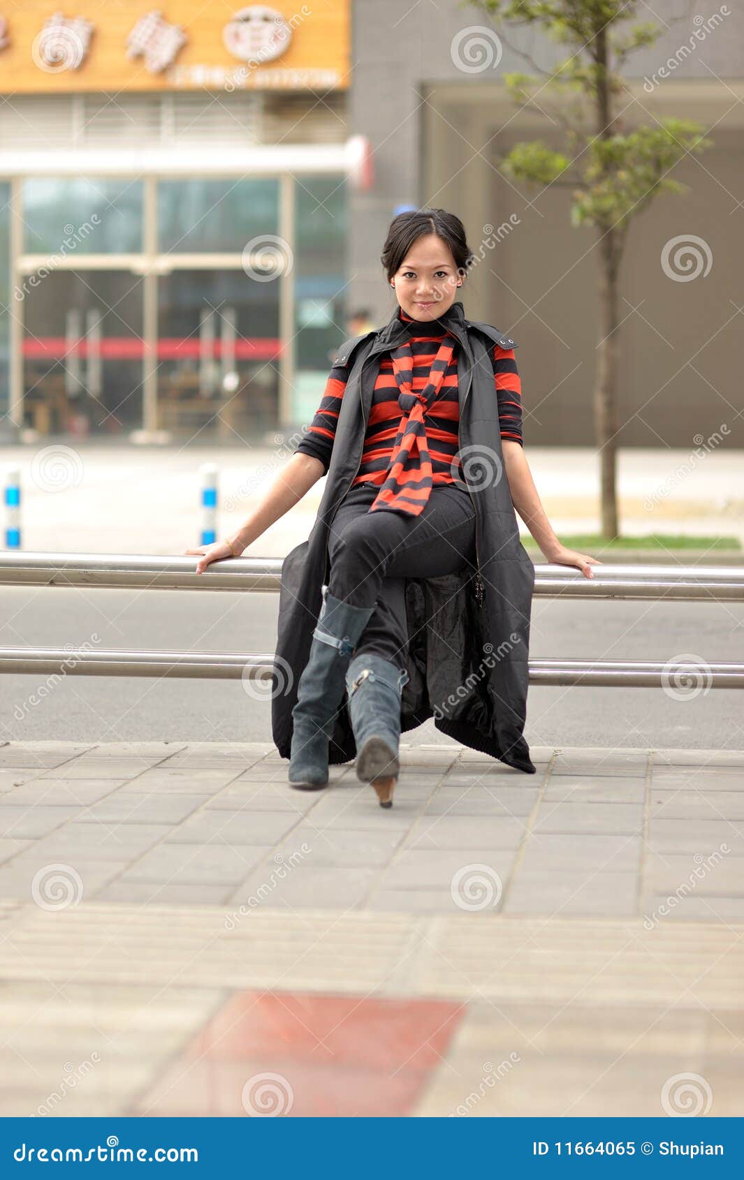Woman Sitting on the Railings Stock Image - Image of outdoor, outdoors ...