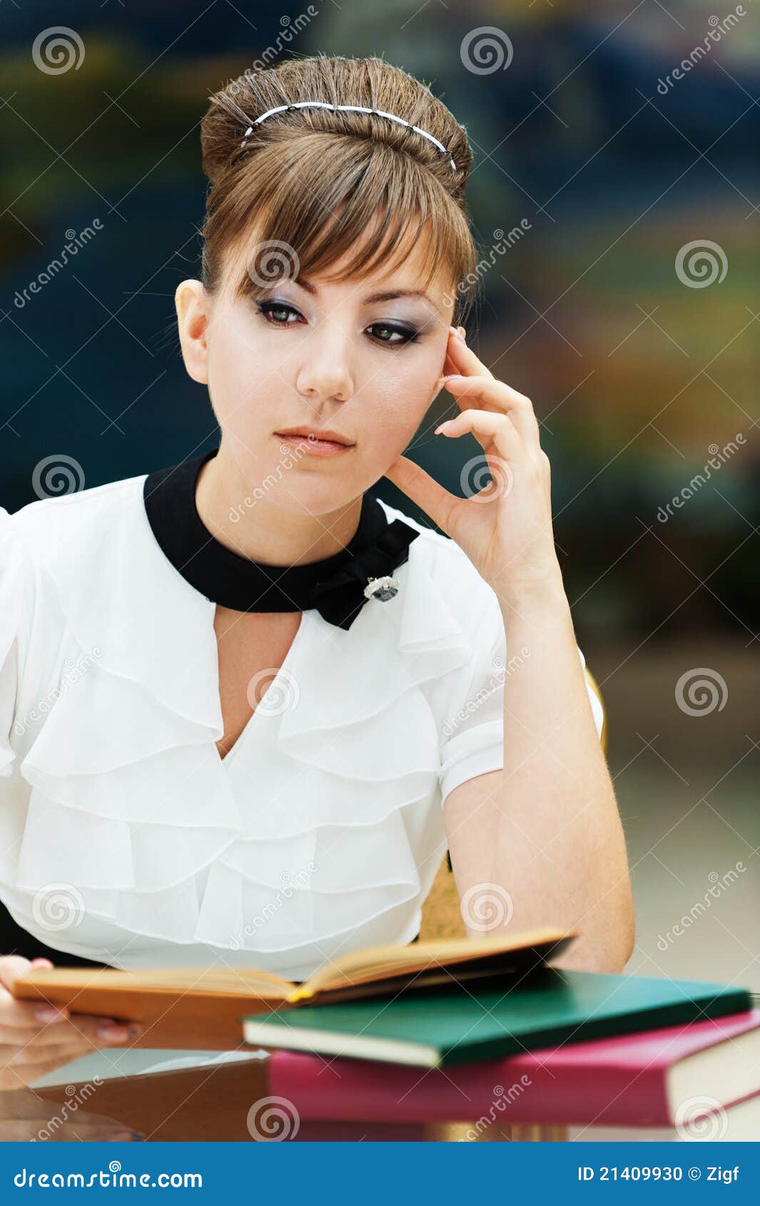 Woman sitting reading book stock photo. Image of books - 21409930