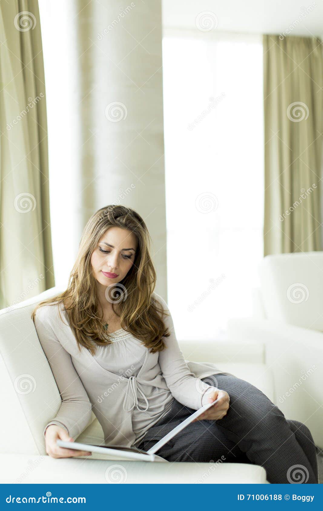 Woman sitting and reading stock photo. Image of smile - 71006188