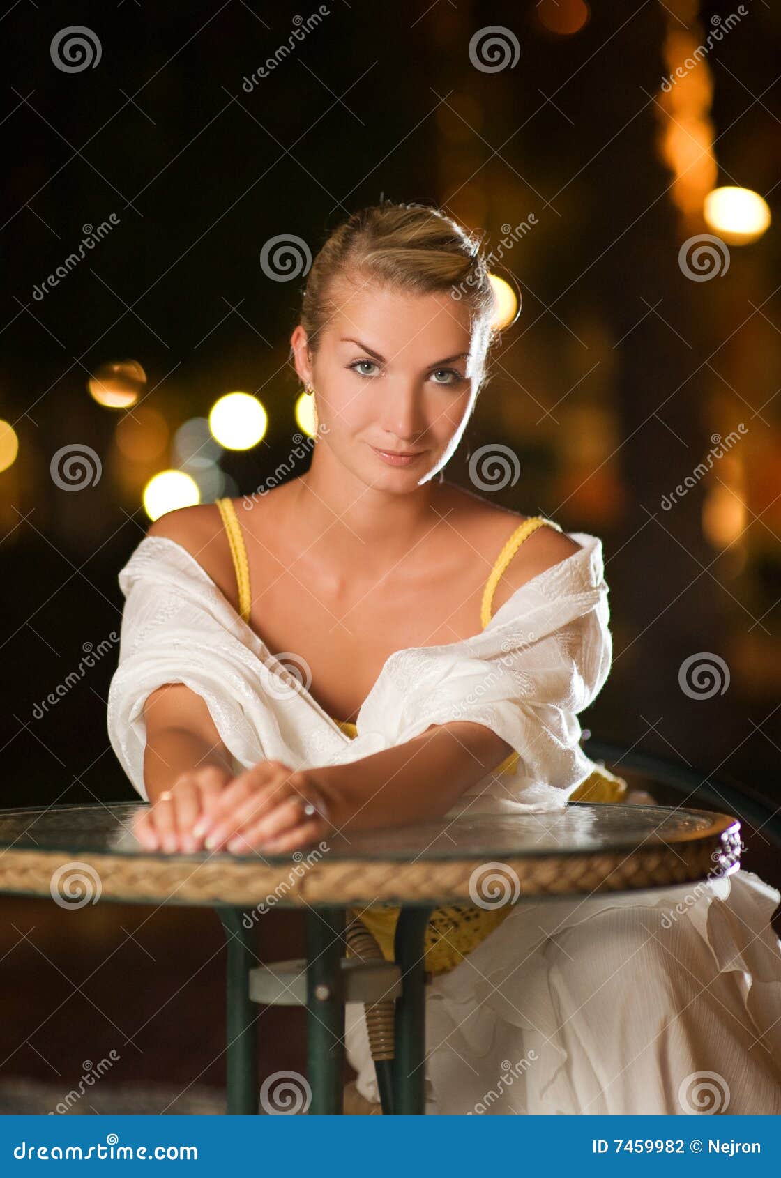 Woman Sitting in a Restaurant Stock Photo - Image of girl, night: 7459982