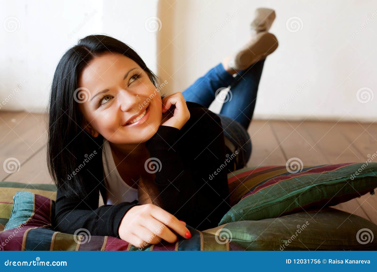 Woman Sitting and Smiling Indoors Stock Photo - Image of cushion ...