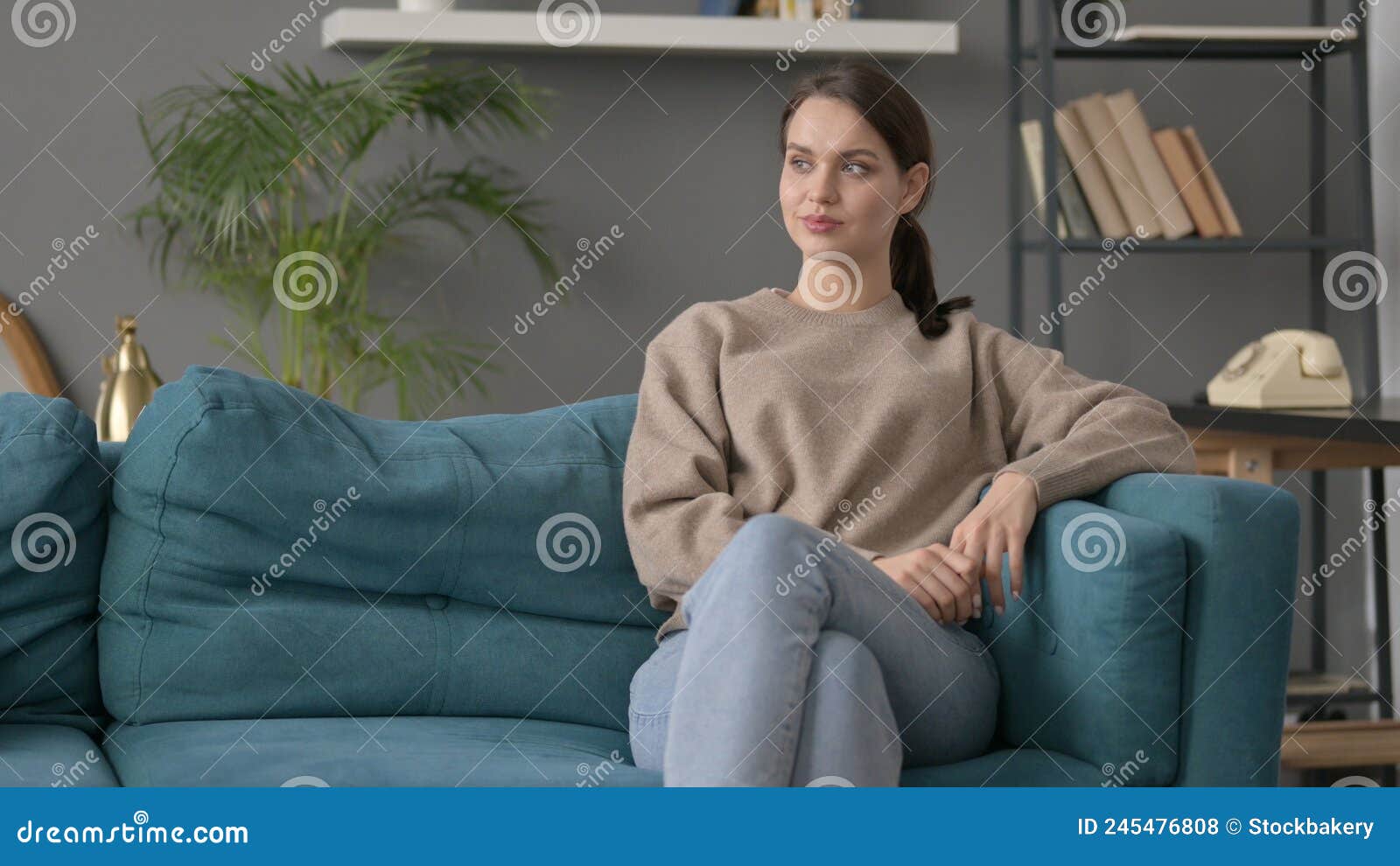 Woman Sitting on Sofa Thinking Stock Photo - Image of home, ideas ...