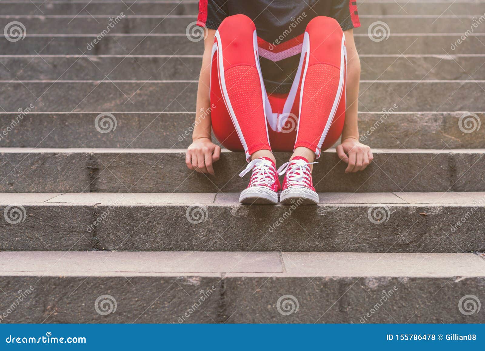 Woman sitting on stairs stock photo. Image of stairs - 155786478