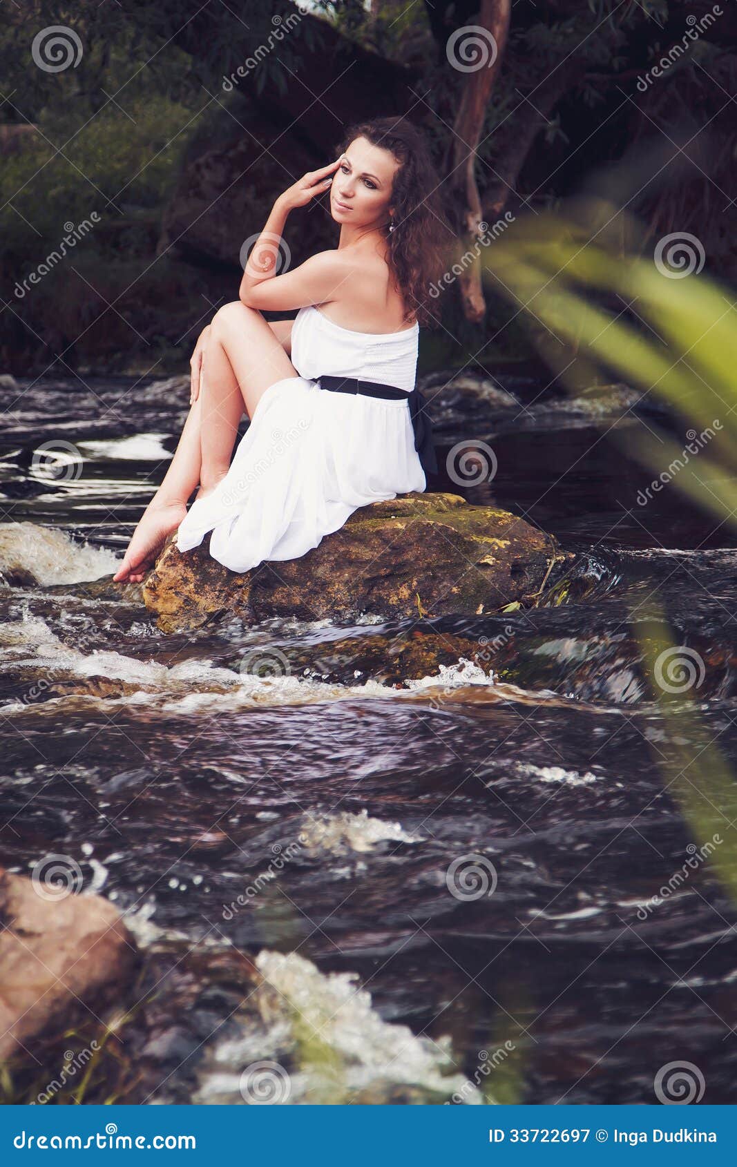 Woman sitting on a stone stock image. Image of human - 33722697