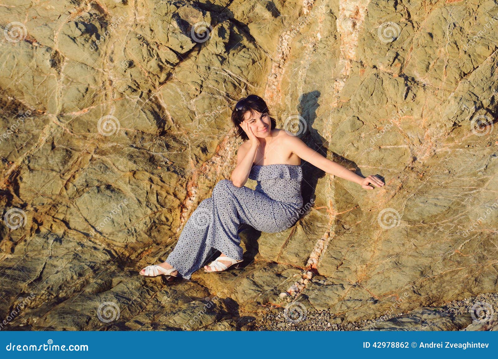 Woman Sitting on Stone stock photo. Image of person, outdoors - 42978862