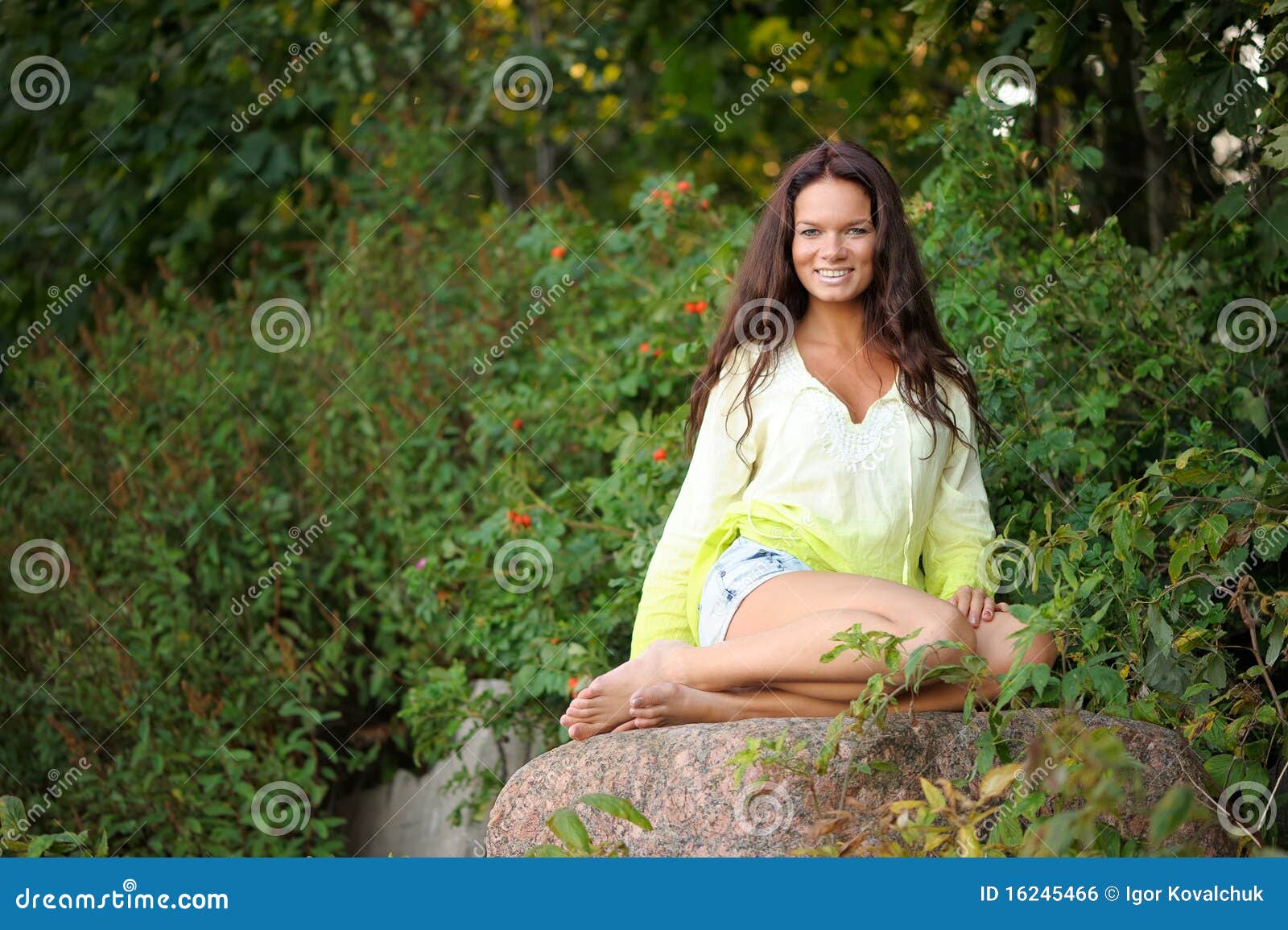 Woman sitting on stones stock photo. Image of nature - 16245466