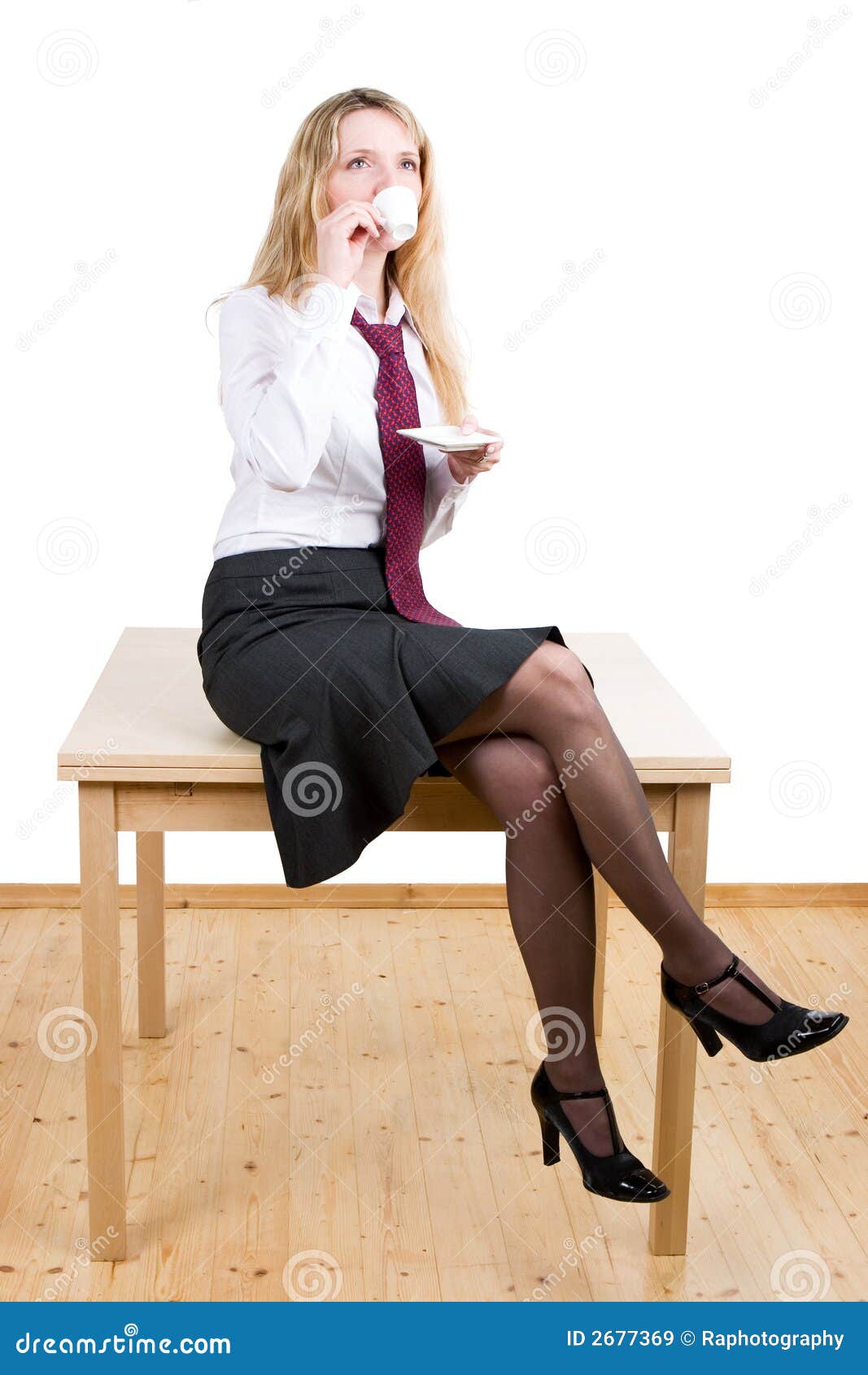 A woman sitting on a table stock image. Image of consensus - 2677369 A woman sitting on a table stock image. Image of consensus - 2677369
