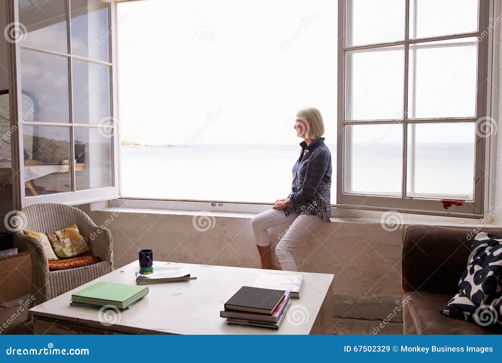 Woman Sitting at Window and Looking at Beautiful Beach View Stock Image ...