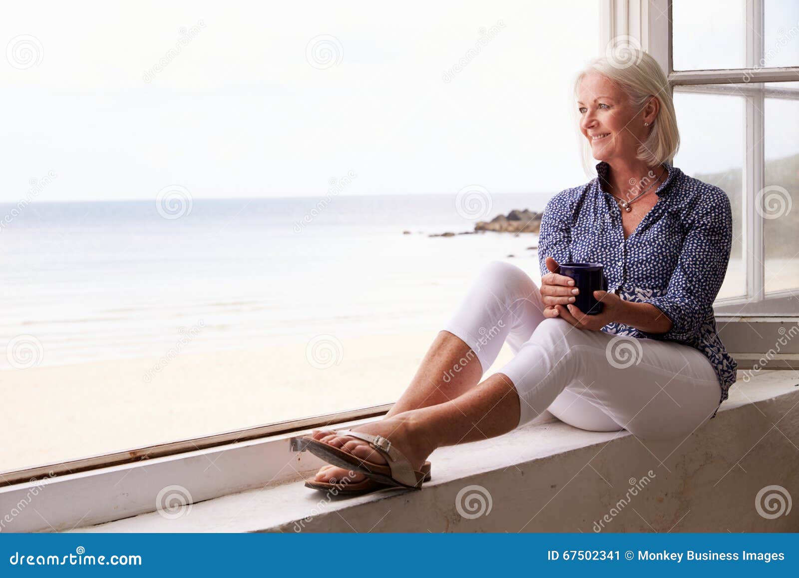 Woman Sitting at Window and Looking at Beautiful Beach View Stock Image ...
