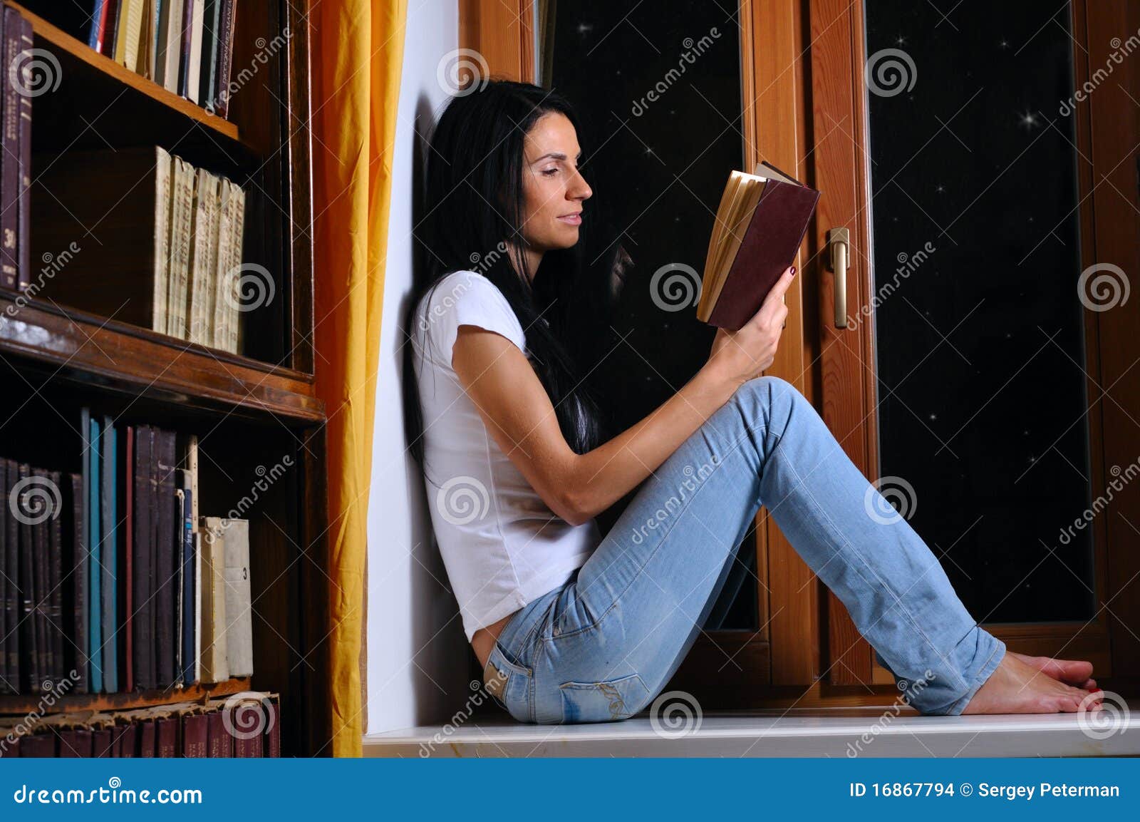Woman is Sitting on Window and Reading Stock Photo - Image of casual ...