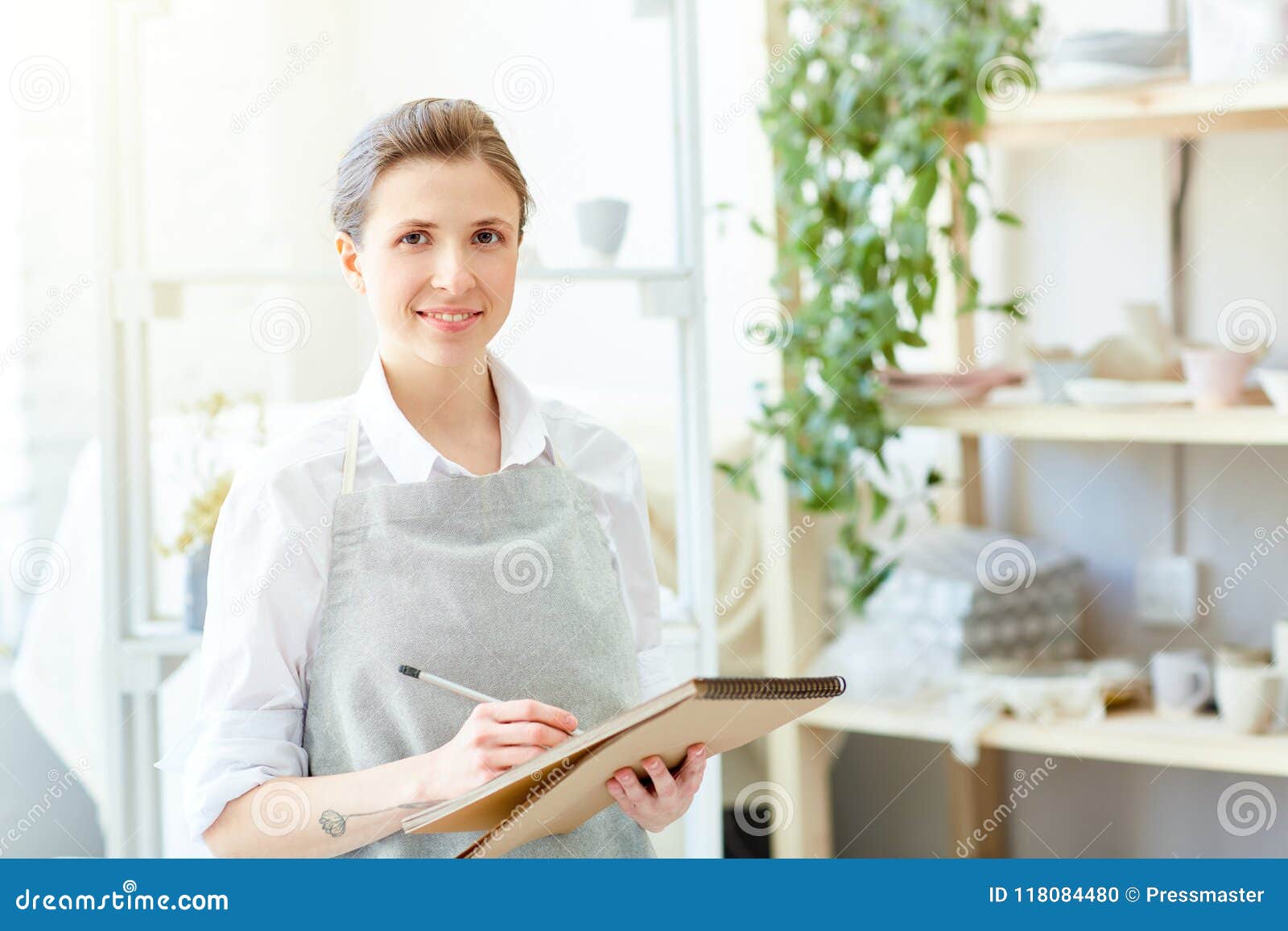 Woman sketching stock photo. Image of manufacturer, apron - 118084480