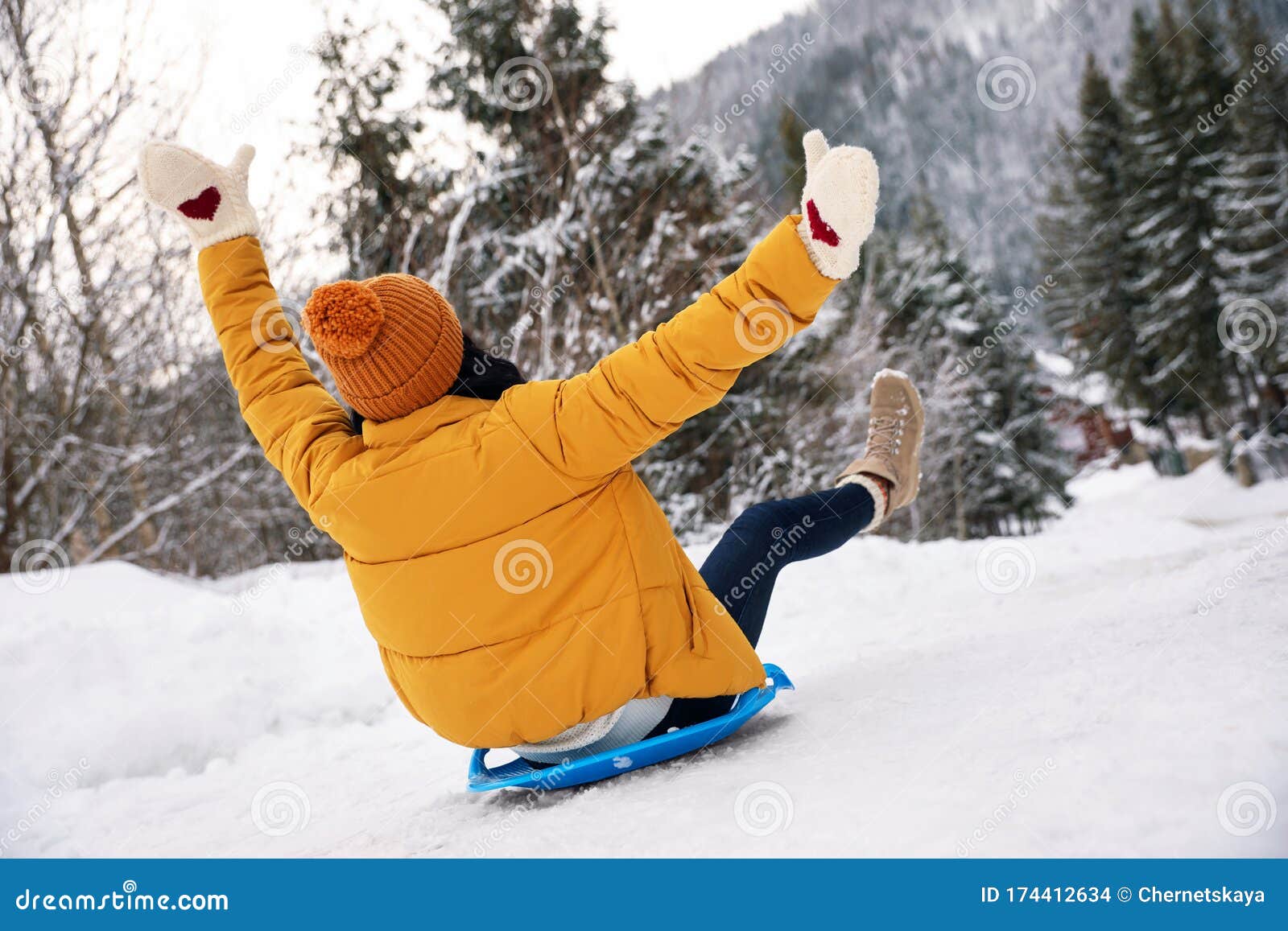 Woman Sledding Outdoors. Winter Vacation Stock Photo - Image of snowy ...