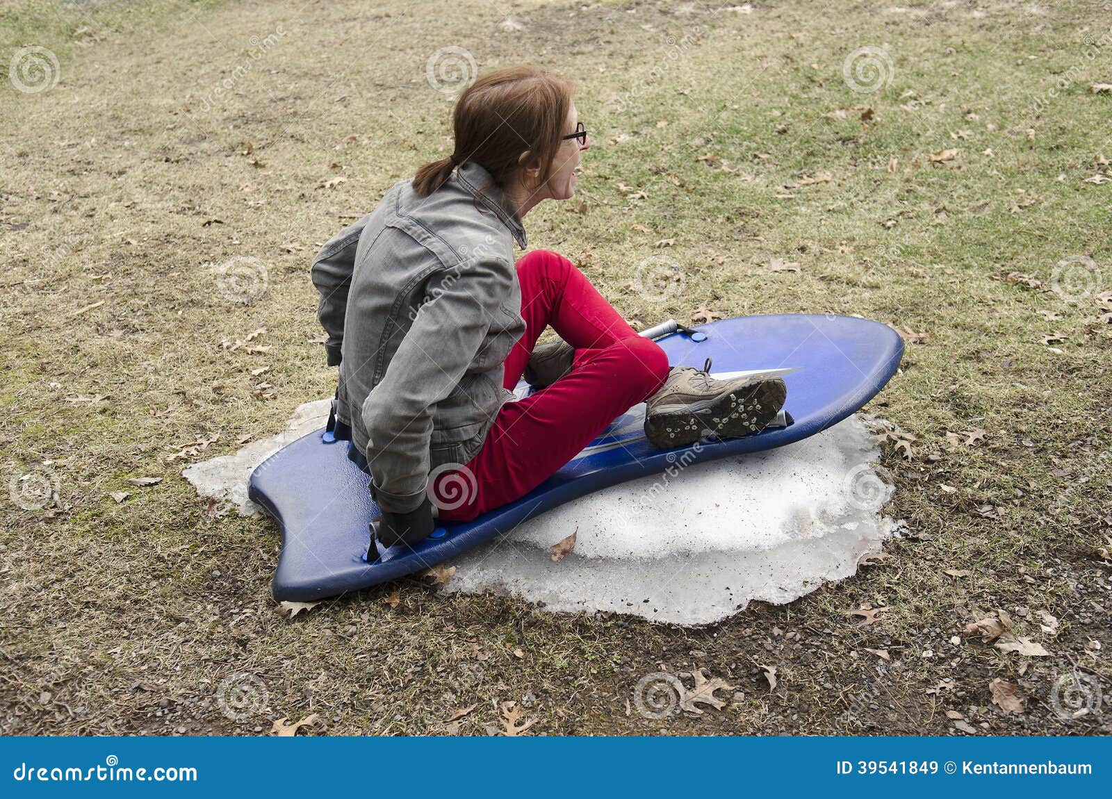 Woman Sledding on Small Amount of Snow Stock Image - Image of humor ...