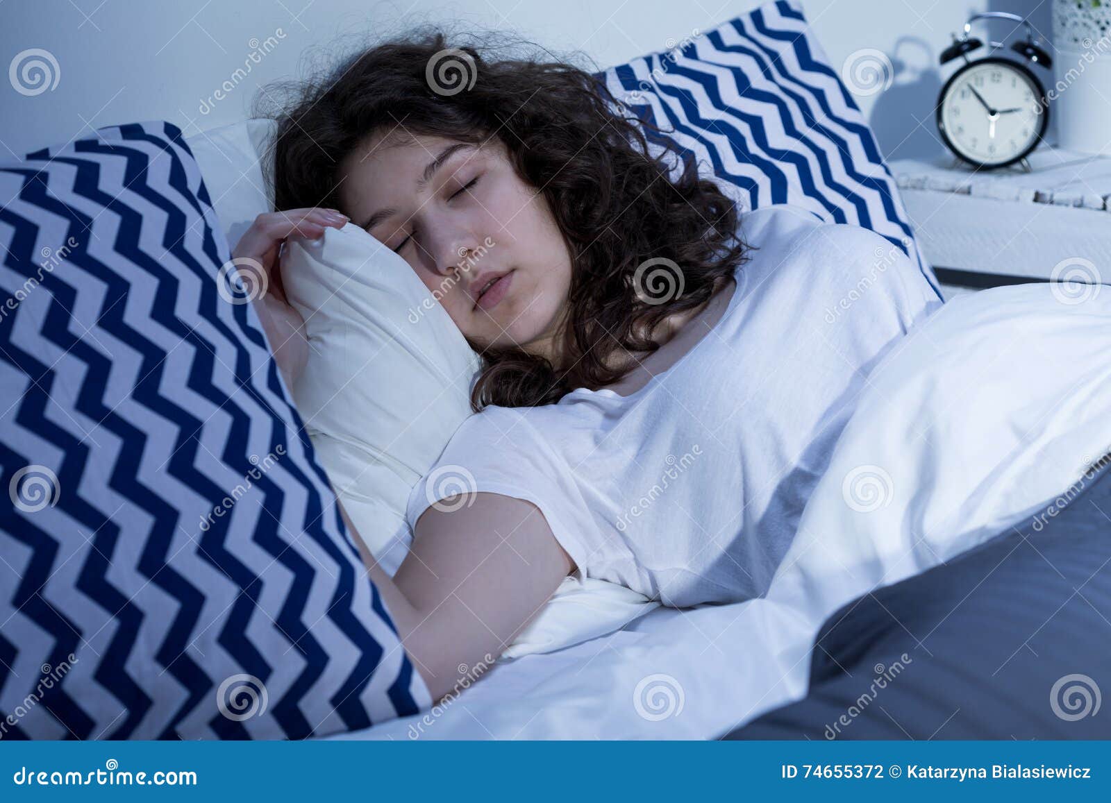 Woman sleeping in bed stock photo. Image of tired, rest - 74655372