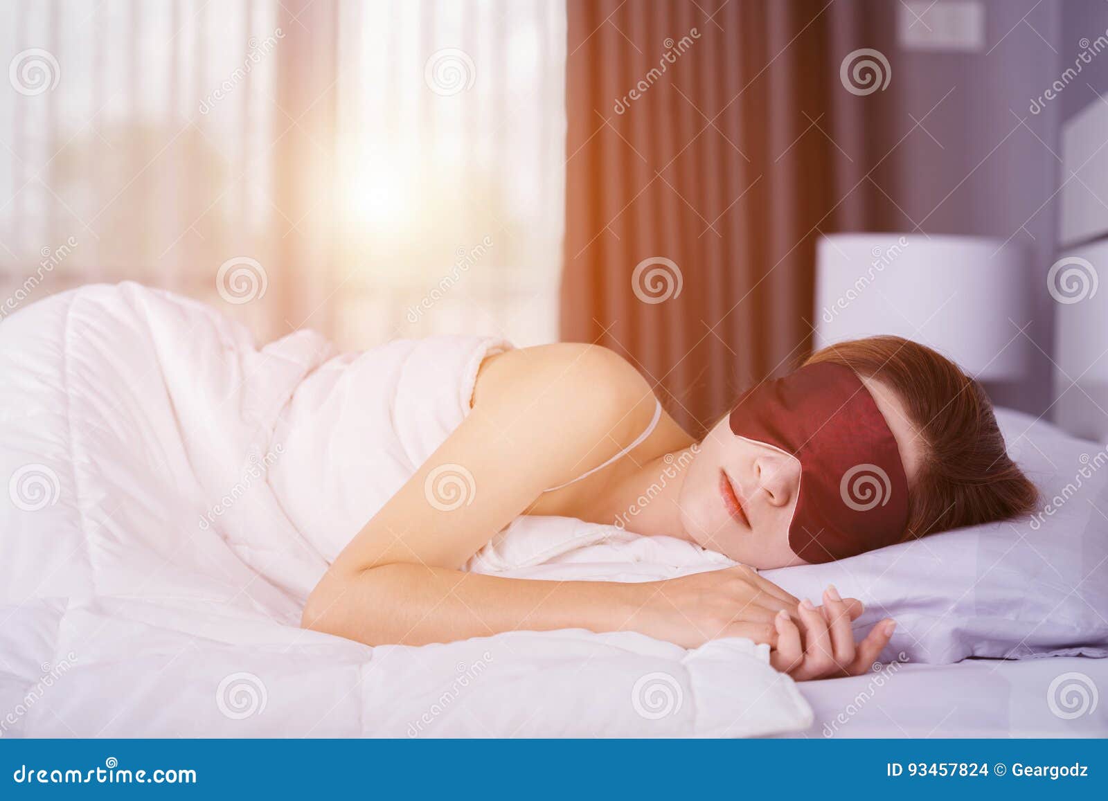 Woman Sleeping on Bed with Eye Mask in Bedroom with Soft Light Stock ...