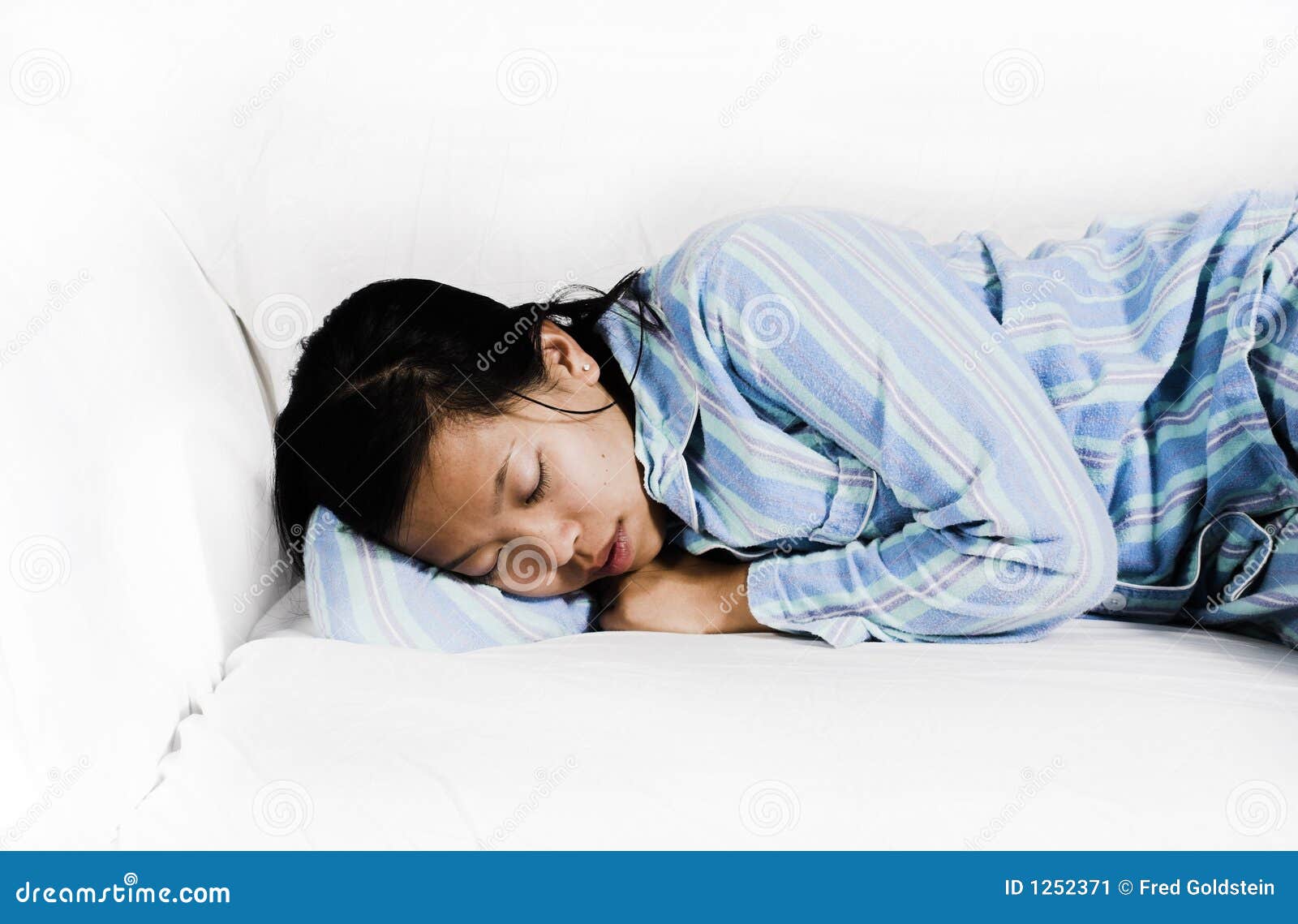 Woman sleeping on couch stock image. Image of isolation - 1252371
