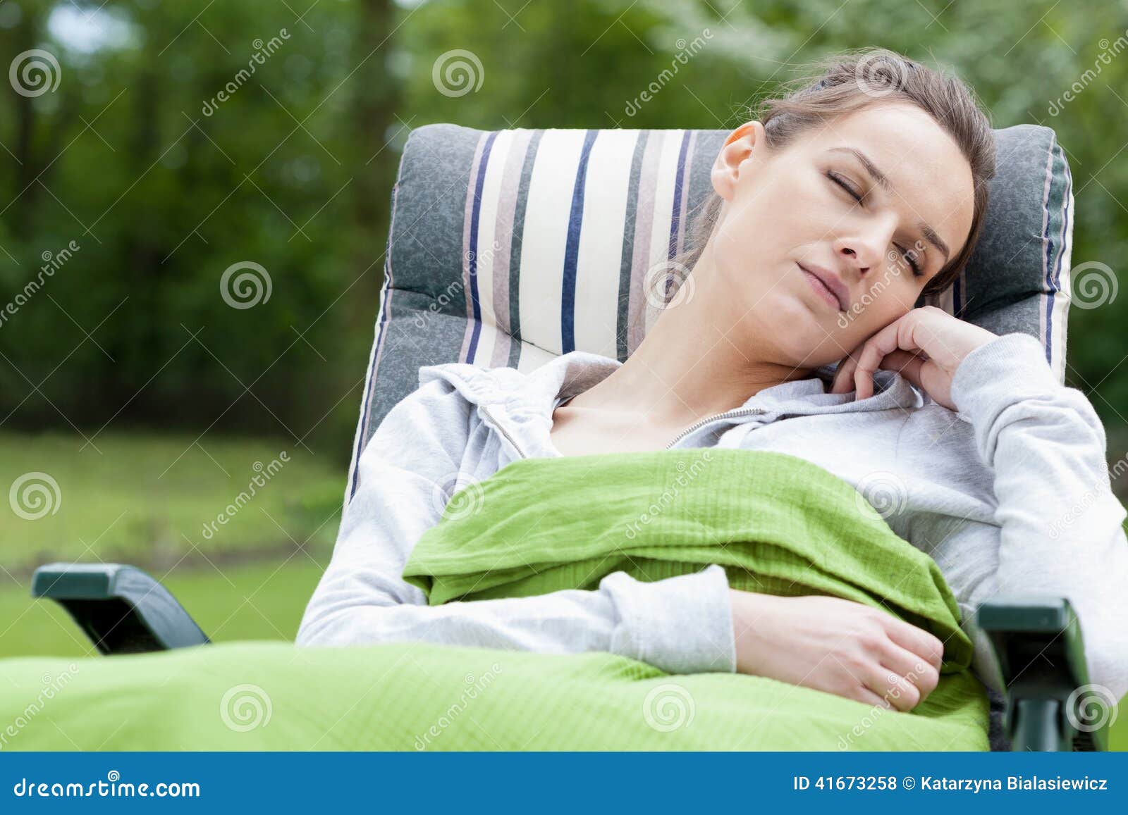 Woman sleeping in a garden stock photo. Image of outdoors - 41673258