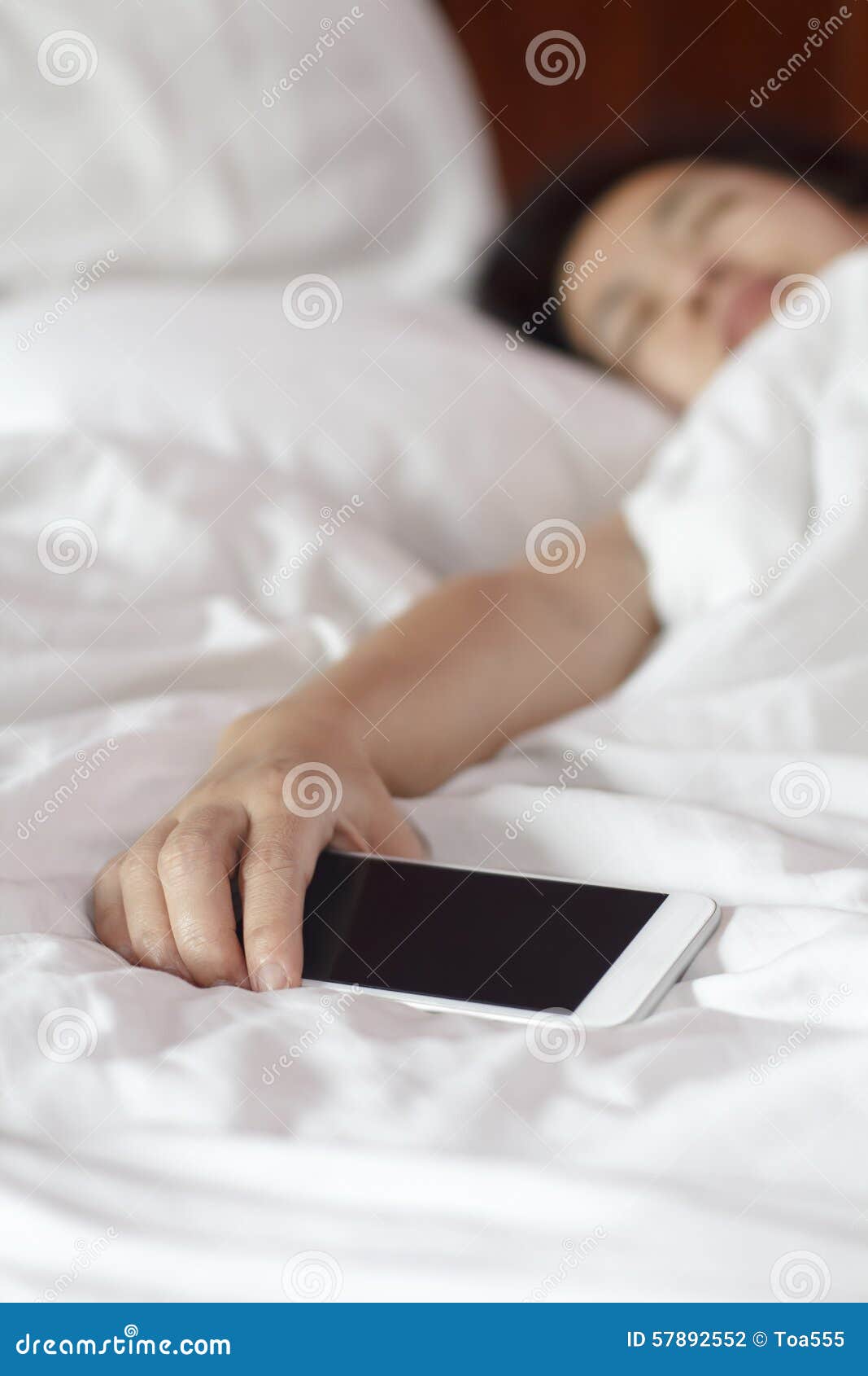 Woman Sleeping and Holding a Mobile Phone. Stock Photo - Image of ...