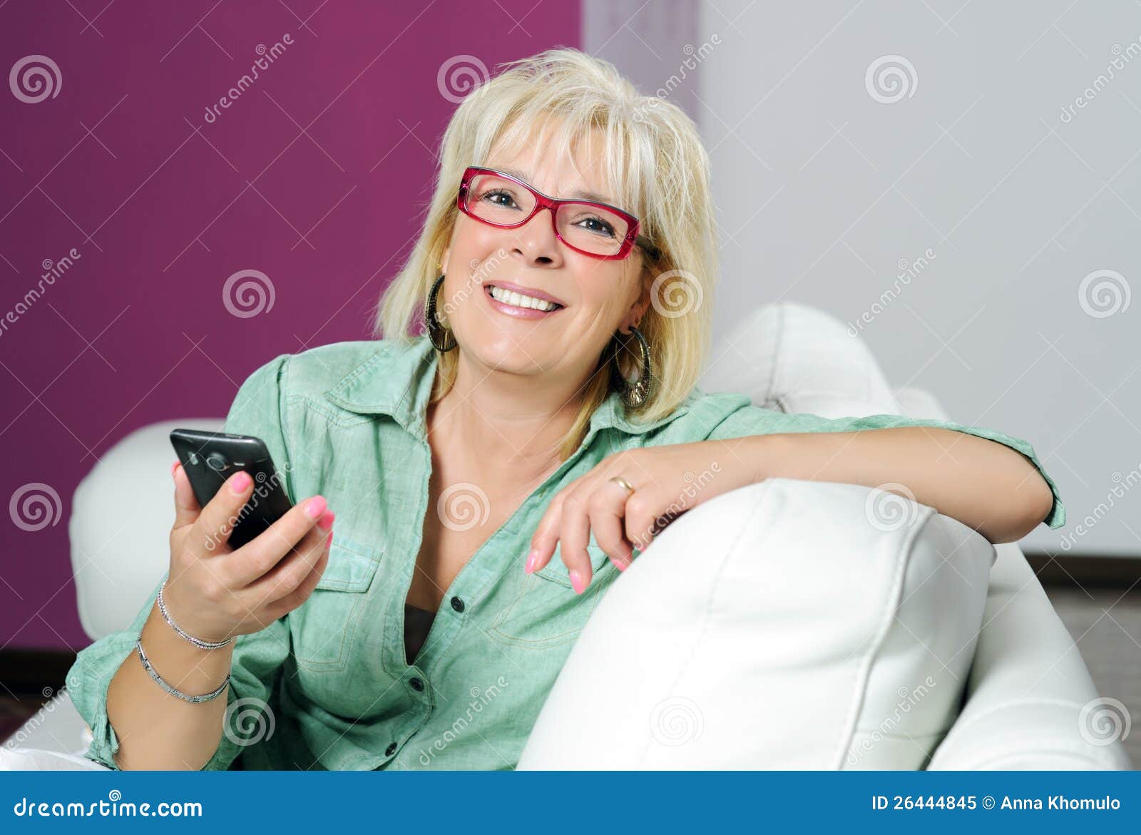 Woman with smartphone stock image. Image of horizontal - 26444845