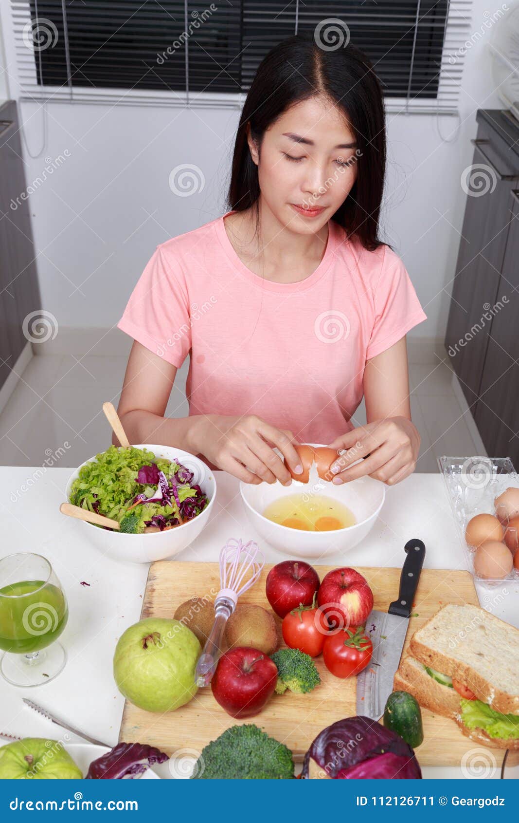 Woman Smashing Eggs in Bowl at Kitchen Room Stock Image - Image of ...