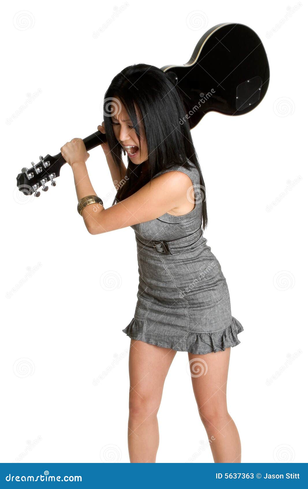 Woman Smashing Guitar stock image. Image of beautiful - 5637363