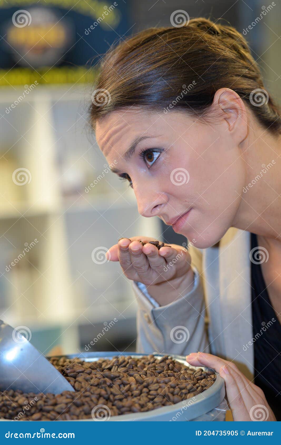 Woman smell coffee beans stock image. Image of adult - 204735905