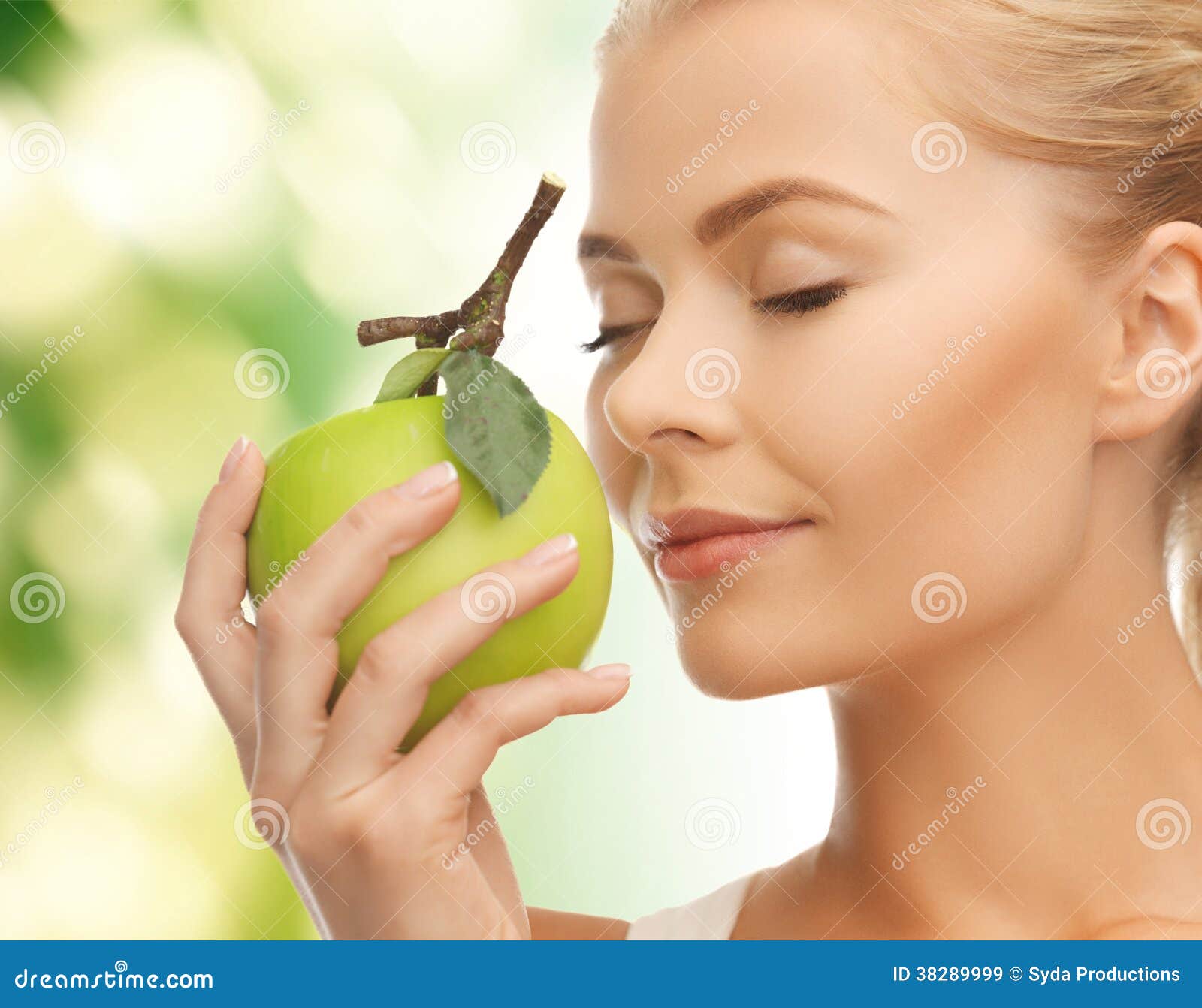 Woman smelling apple stock image. Image of closeup, happy - 38289999
