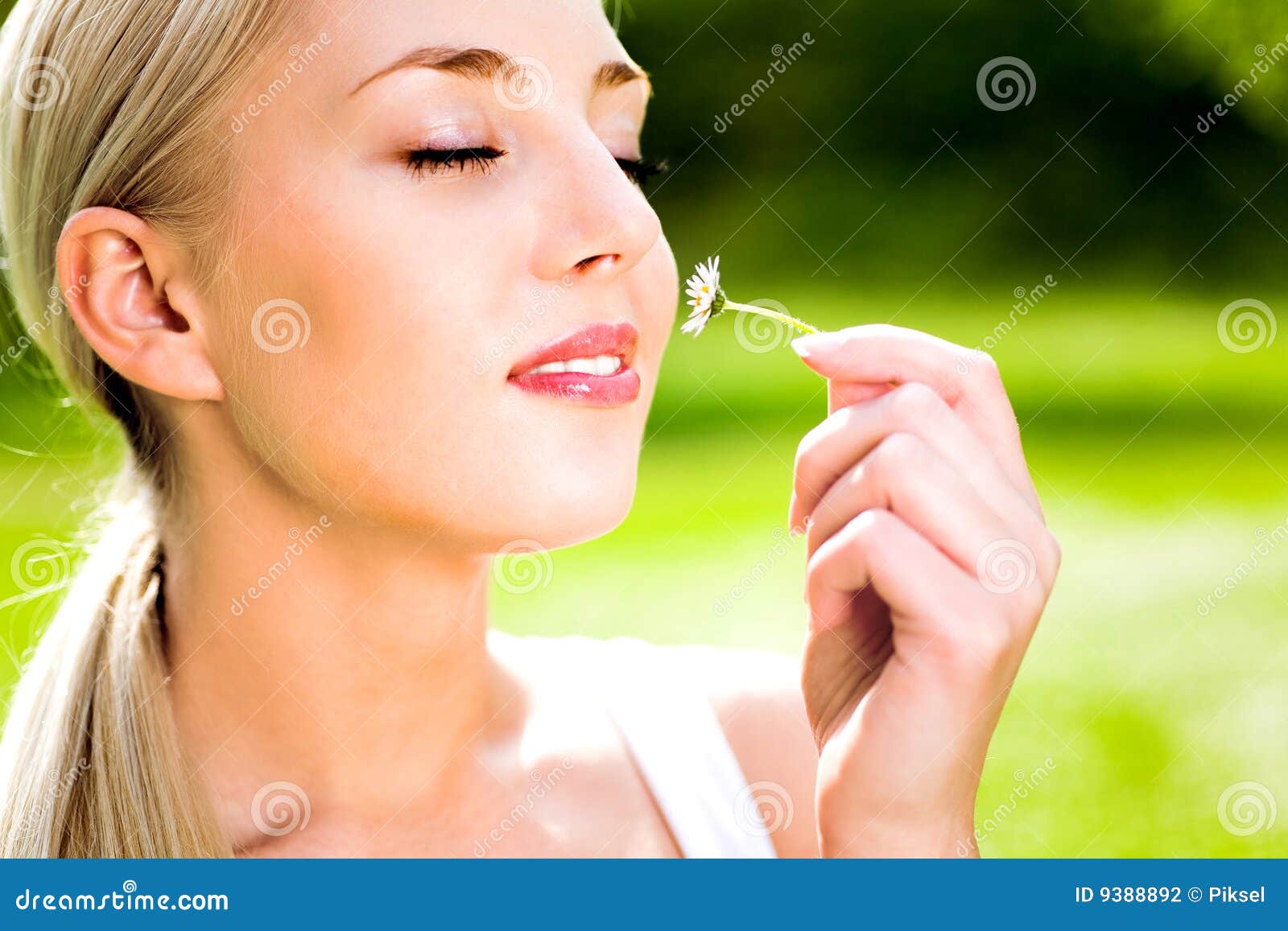 Woman Smelling Flower stock photo. Image of flower, fragrant - 9388892